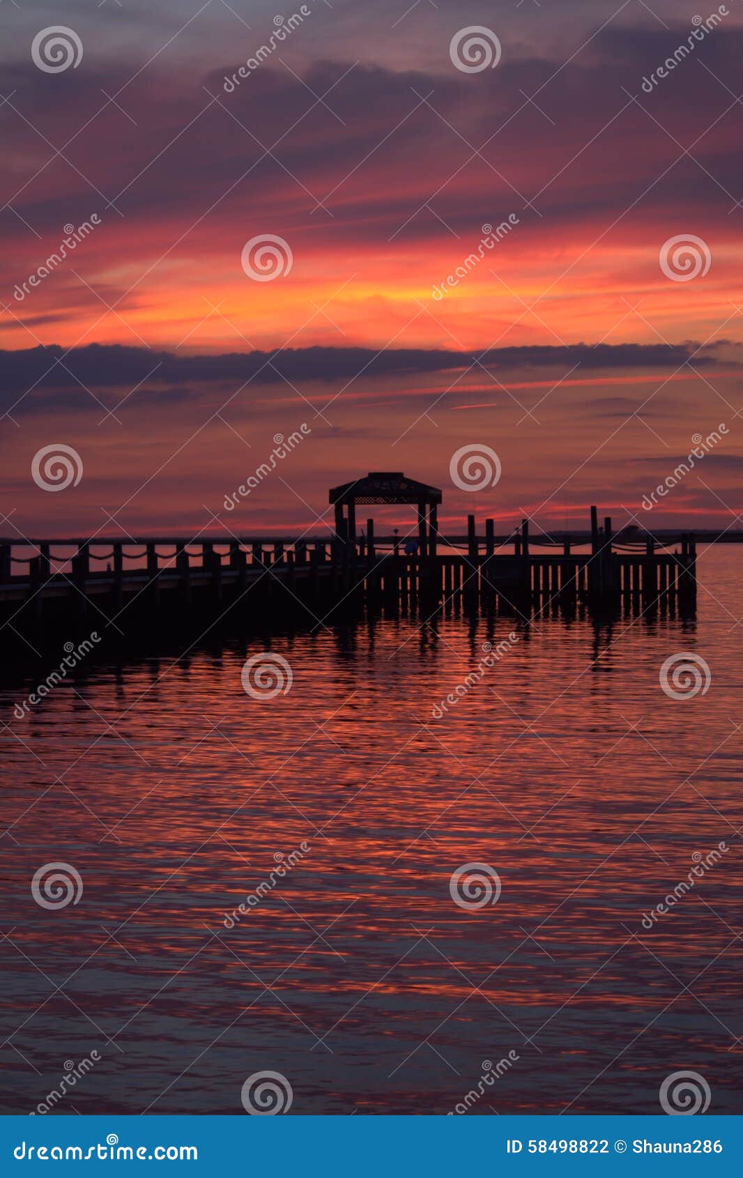 Vibrantly Colored Sunset Over the Bay Stock Photo - Image of evening ...