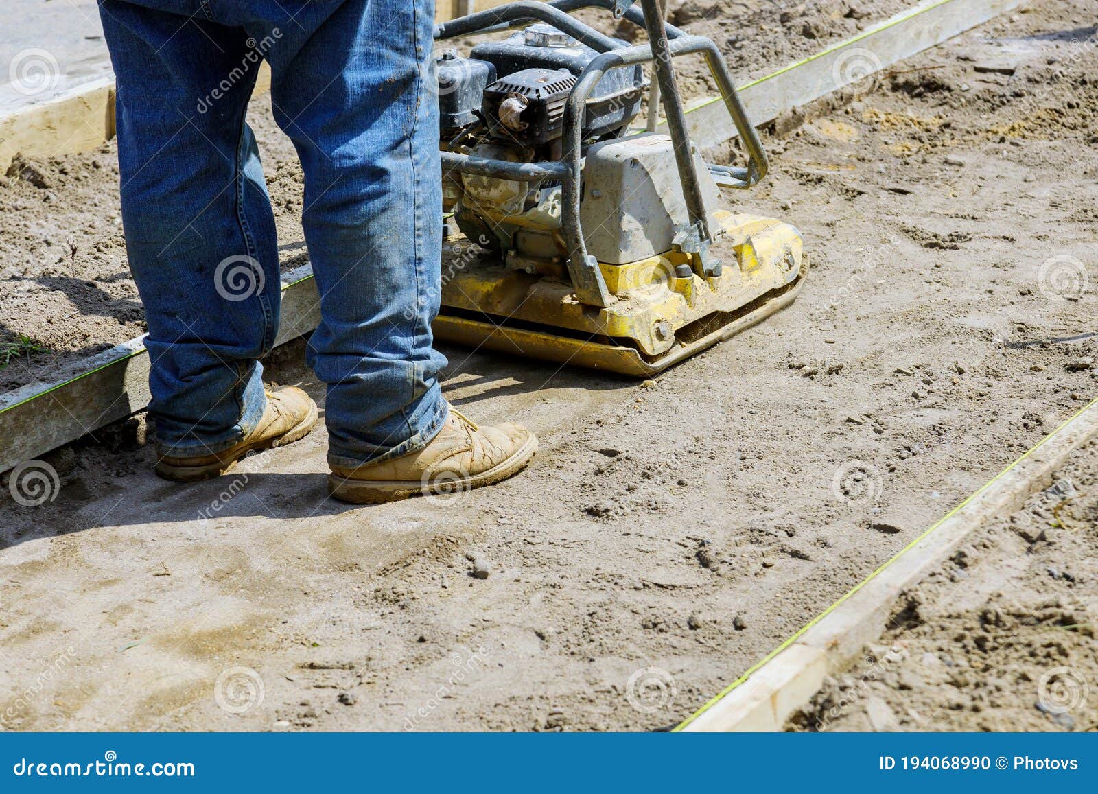 Vibrating Hammer, with Sand Jumping in Process in the during Sidewalk ...