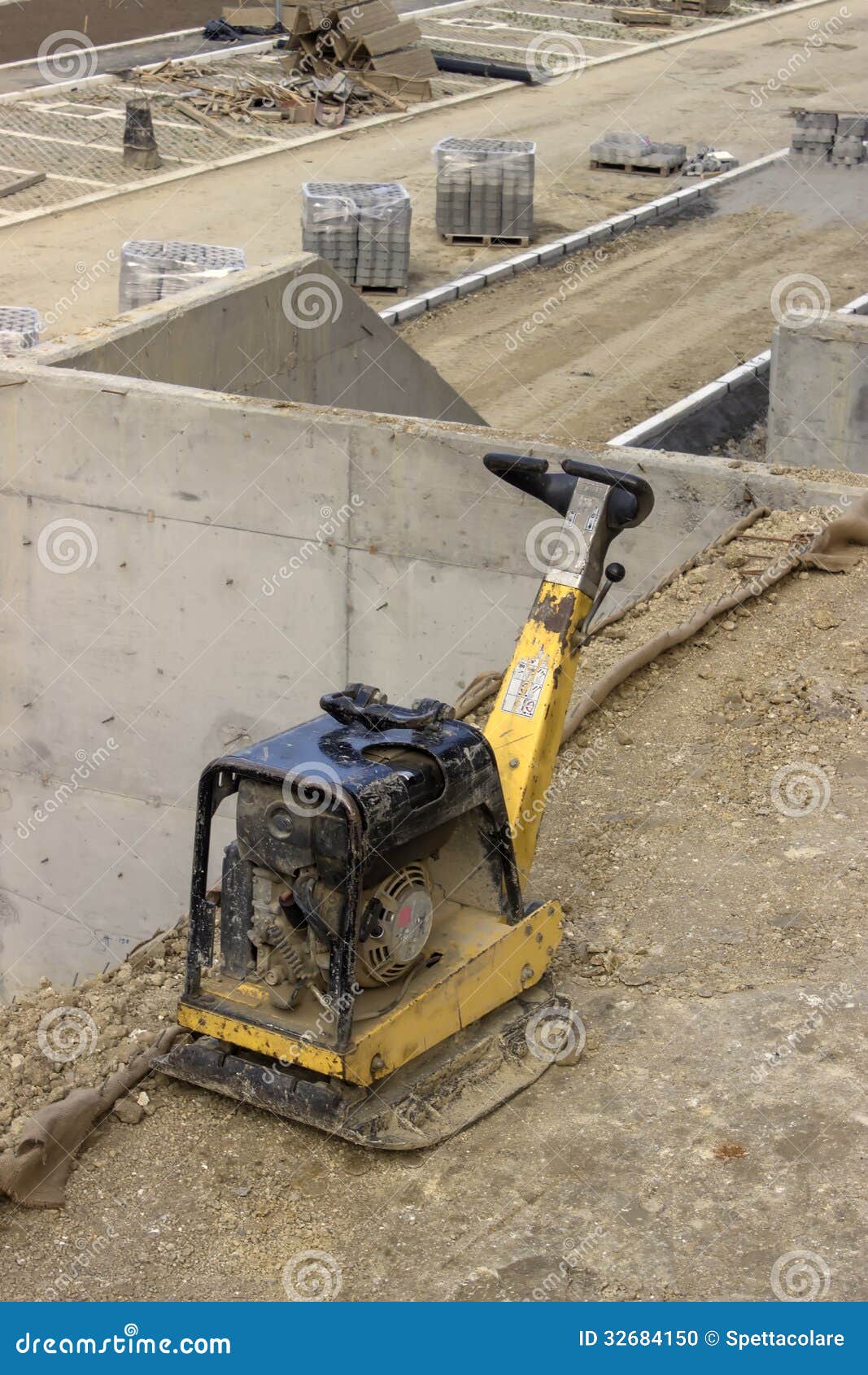 Vibrating Machine at Construction Site Stock Photo - Image of renewal ...