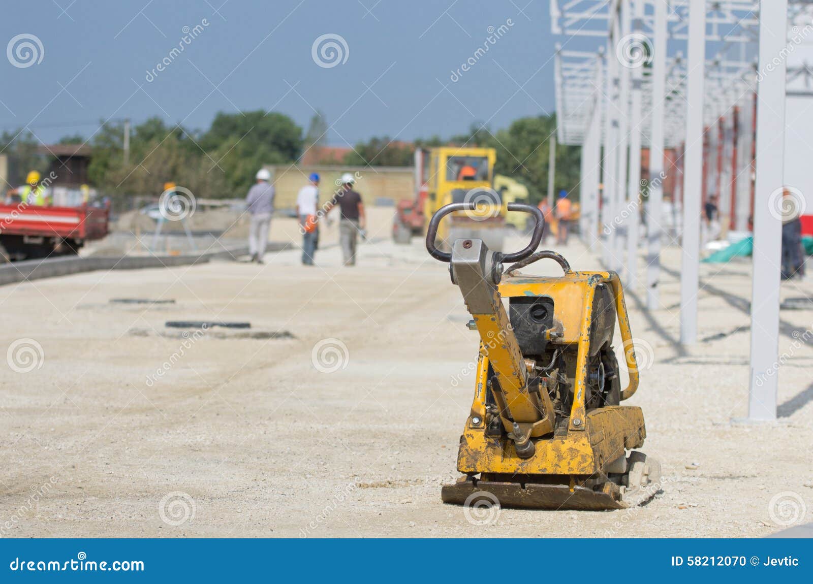 Vibrating Plate Compactor at Construction Site Stock Photo - Image of ...