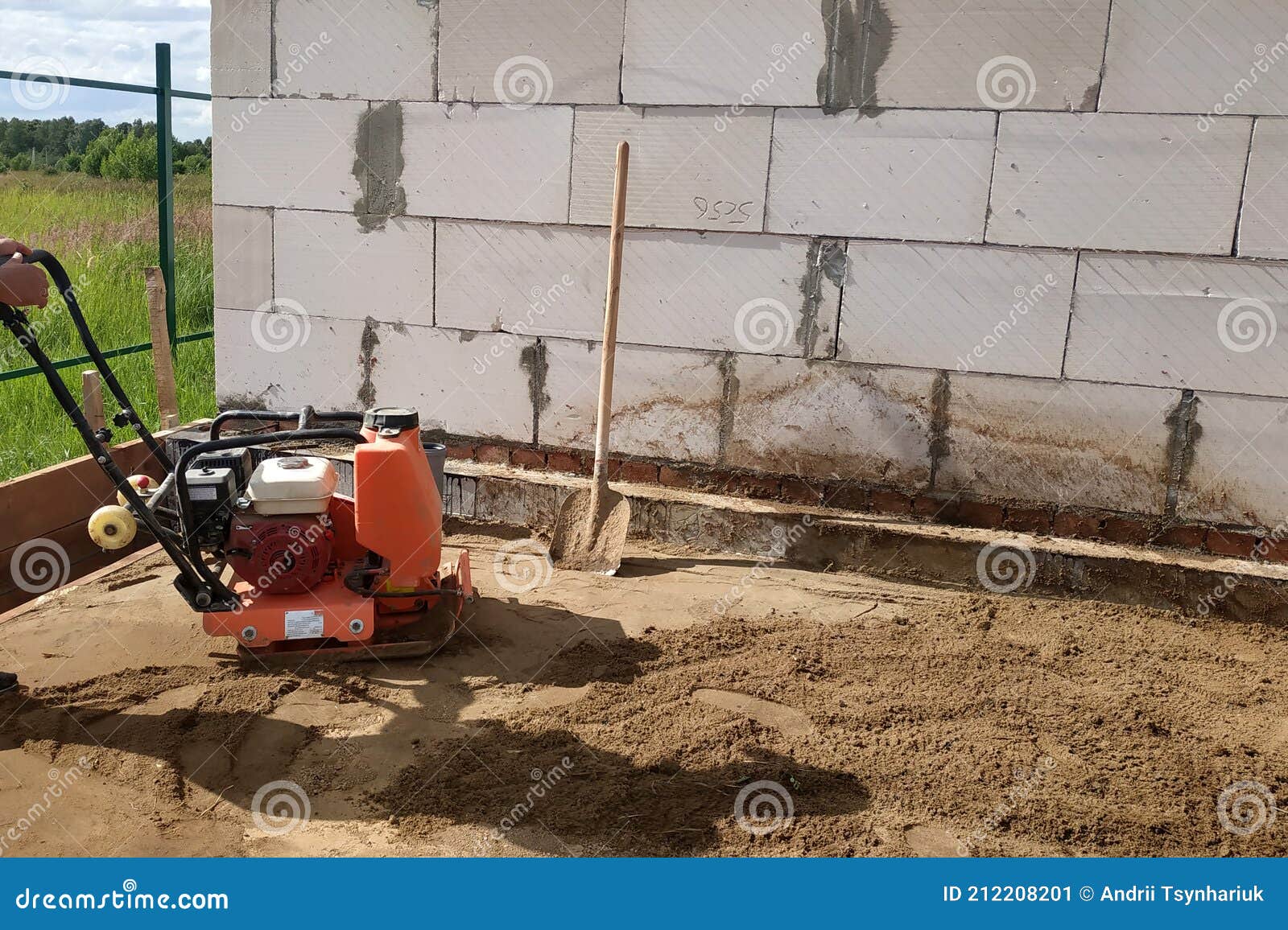 Vibrating Plate in Use, the Worker with the Help of a Vibrating Plate ...