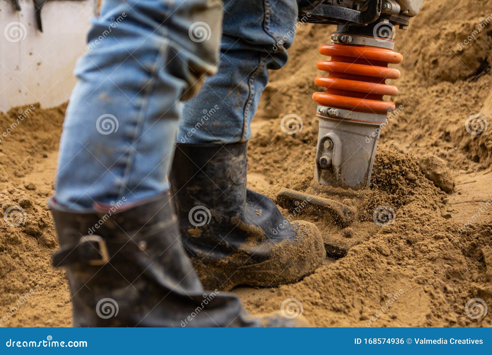 Vibratory Hydraulic Earth Rammer at Work Stock Photo - Image of ...