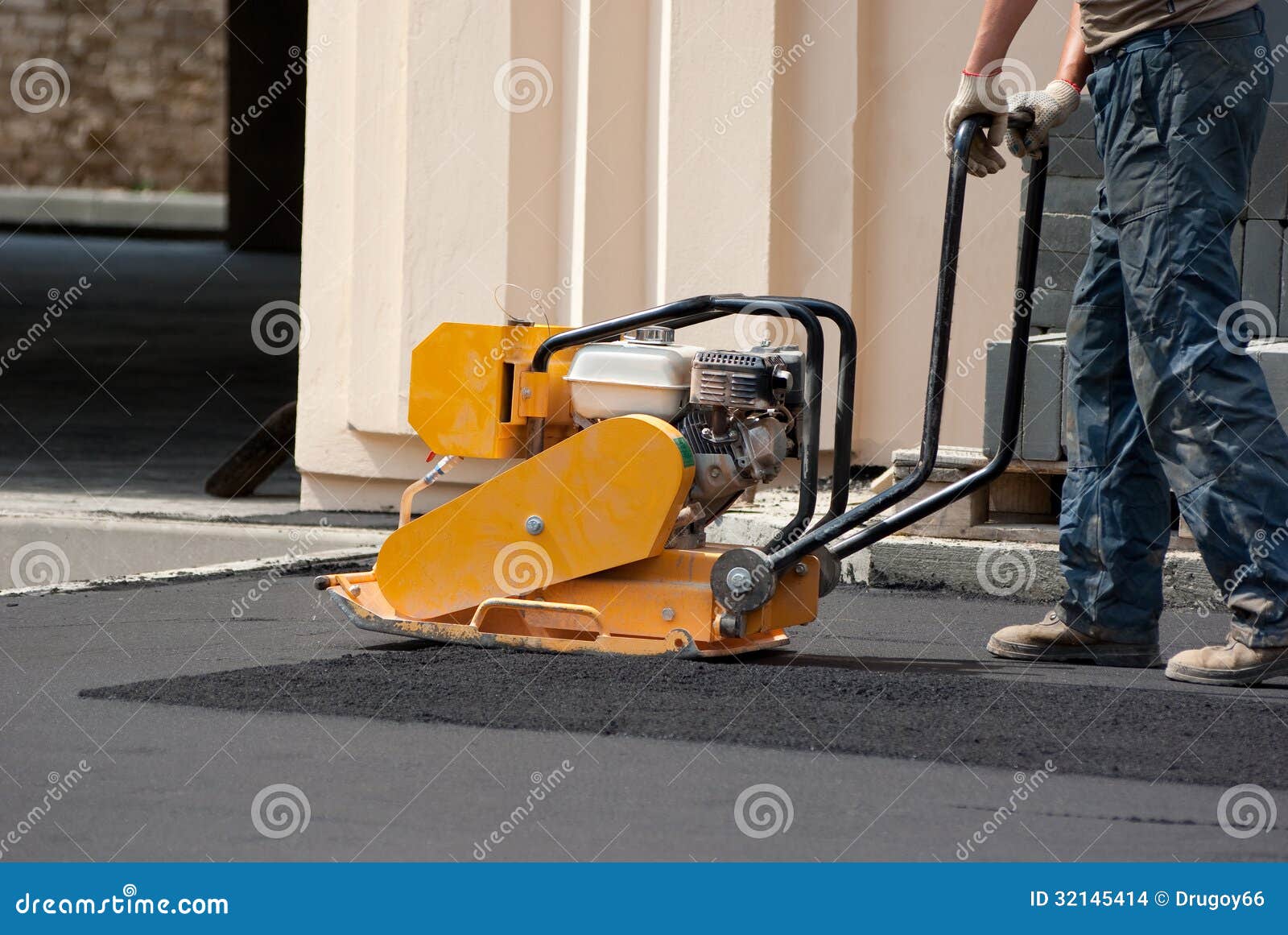 Vibratory plate compactor stock photo. Image of plate - 32145414