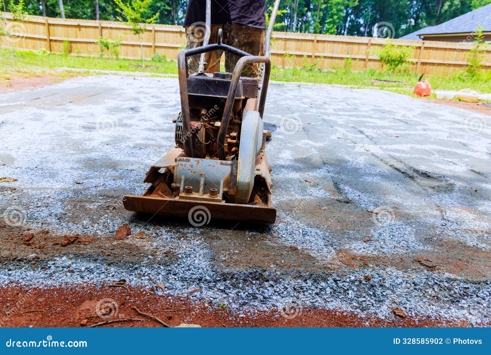 Vibratory Tamping Machine Compacting Sand during Platform Construction ...