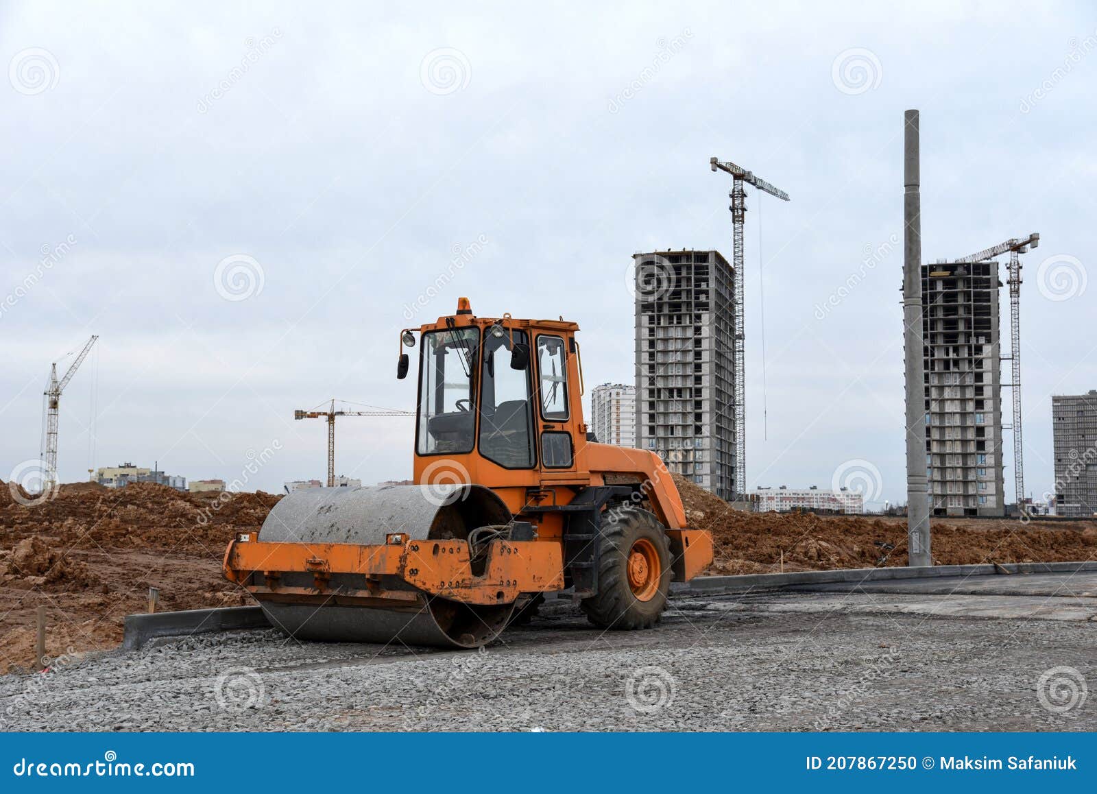 Vibro Roller Soil Compactor Leveling Soil at Construction Site ...