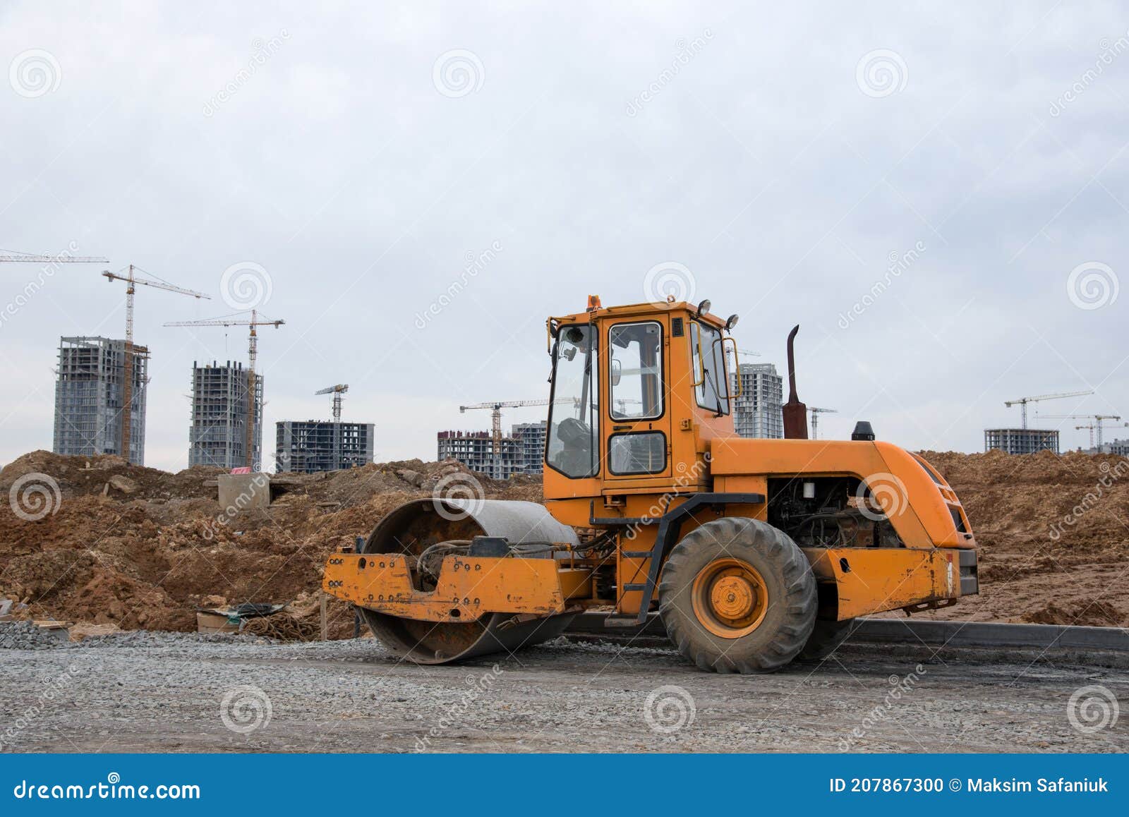 Vibro Roller Soil Compactor Leveling Ground At Construction Site. Tower ...