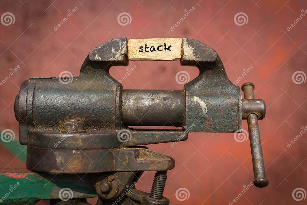 Vice Grip Tool Squeezing a Plank with the Word Stack Stock Image ...