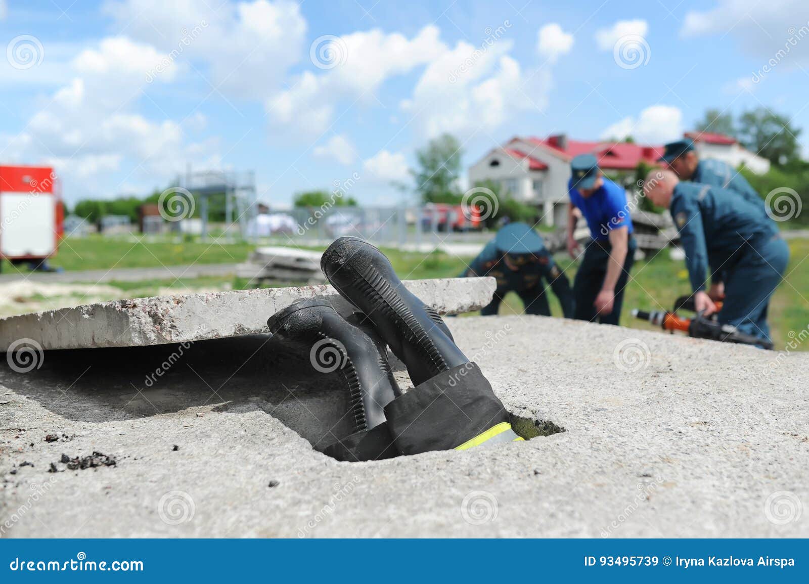 Victim of a Building Collapse. an Unidentified Group of Firemans ...