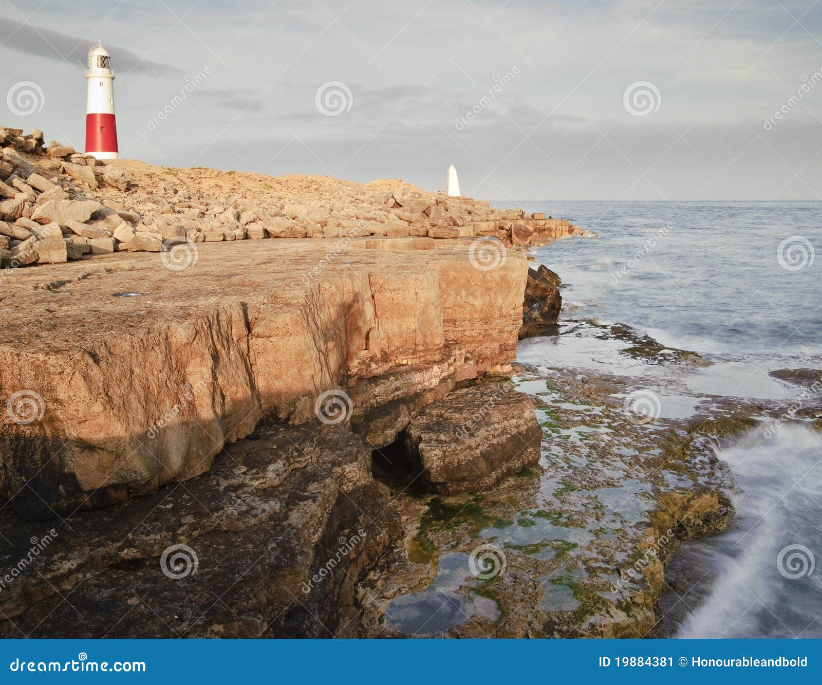 Victorian Lighthouse on Cliffs at Sunset Stock Image - Image of rocks ...