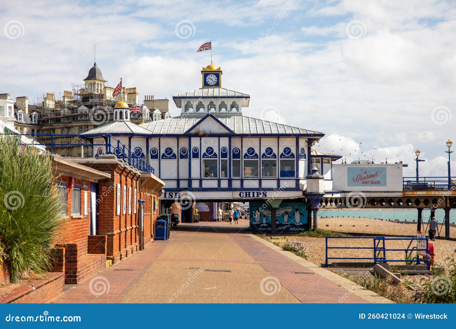 Victorian Pier at Eastbourne with a Large Clock and the UK Flag ...