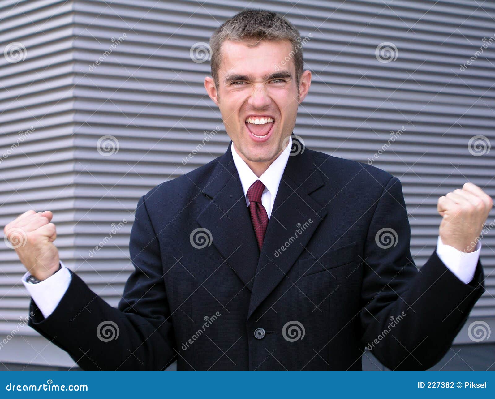 Victorious Businessman stock photo. Image of hands, outdoor - 227382