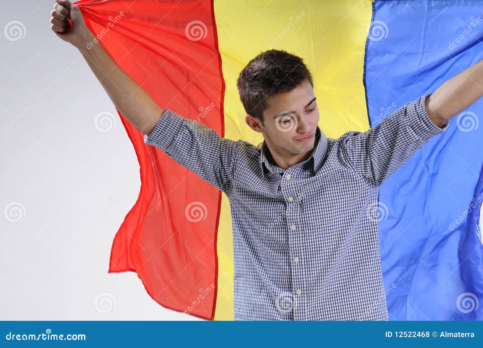 Victorious young man stock photo. Image of colors, success - 12522468