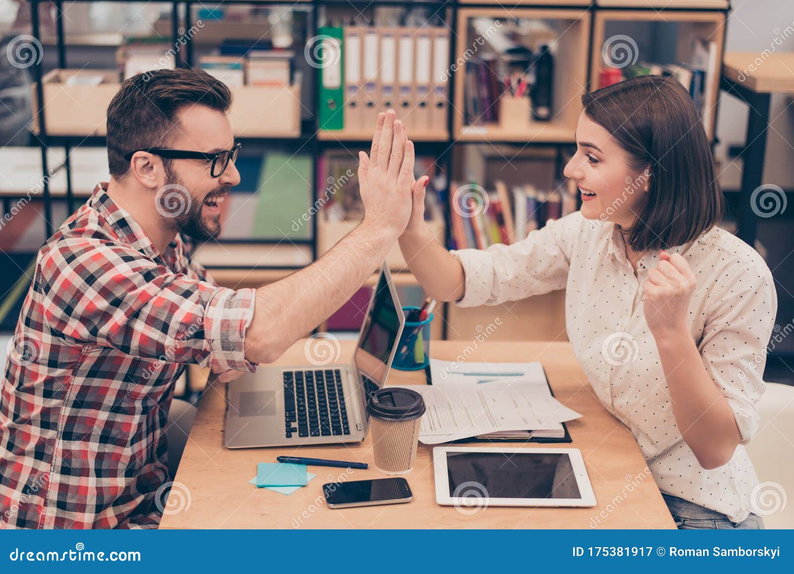 Victory. Two Happy Successful Young Managers Giving High Five Stock ...