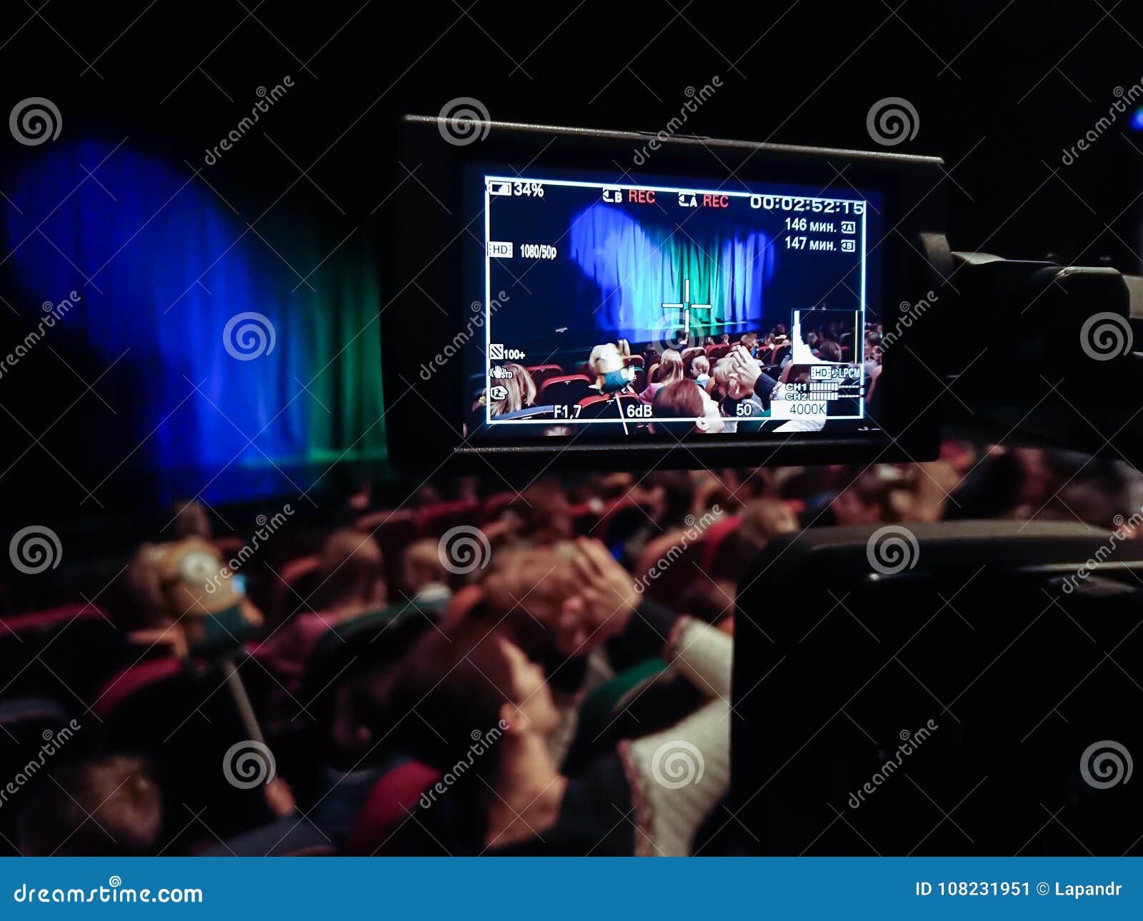 Video Camera in the Auditorium. Spectators Gather in the Hall before ...