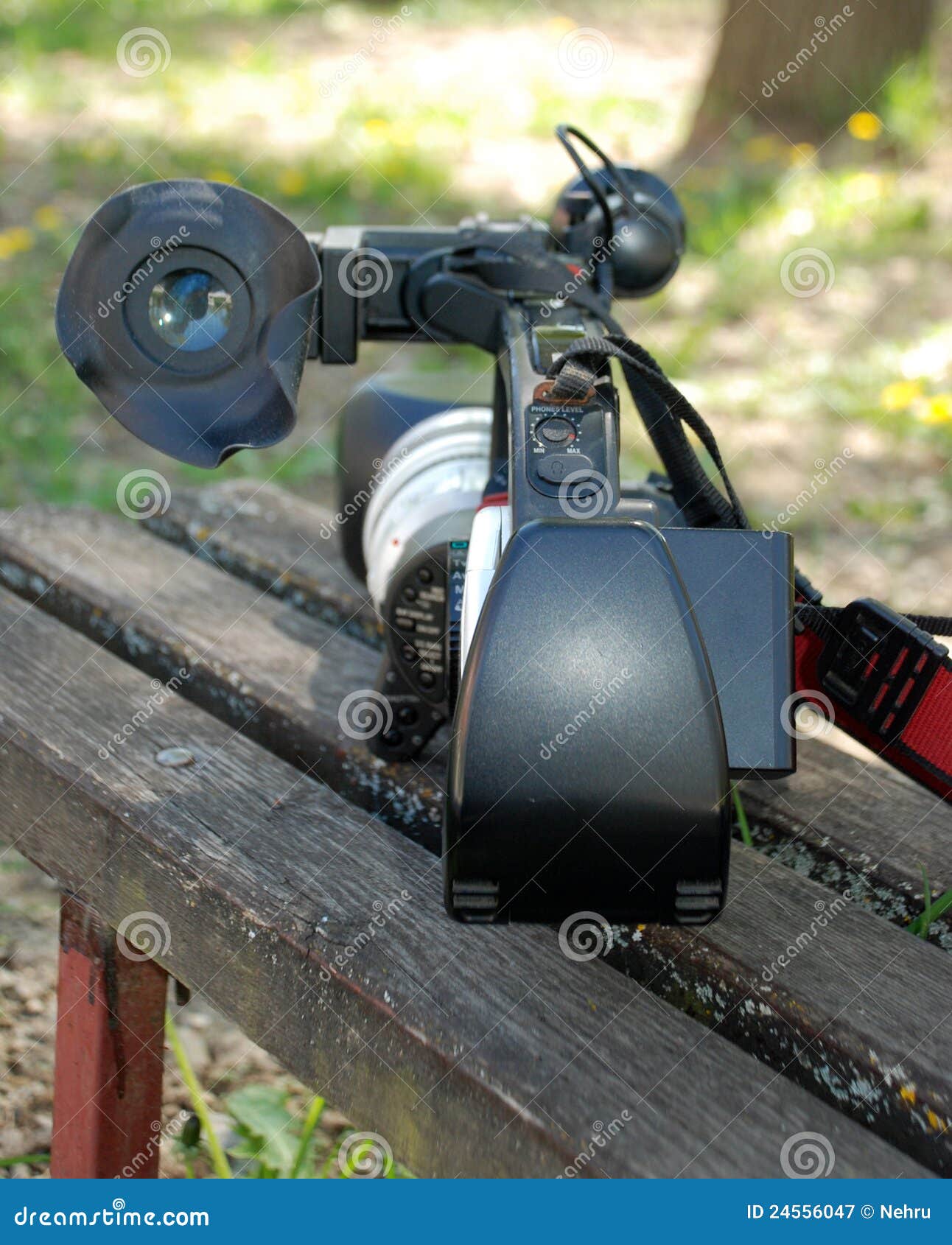 Video camera on a bench stock image. Image of lens, glass - 24556047
