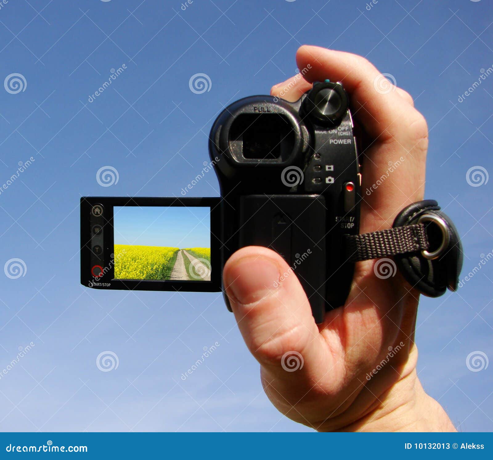 Video camera is in a hand stock image. Image of lens - 10132013