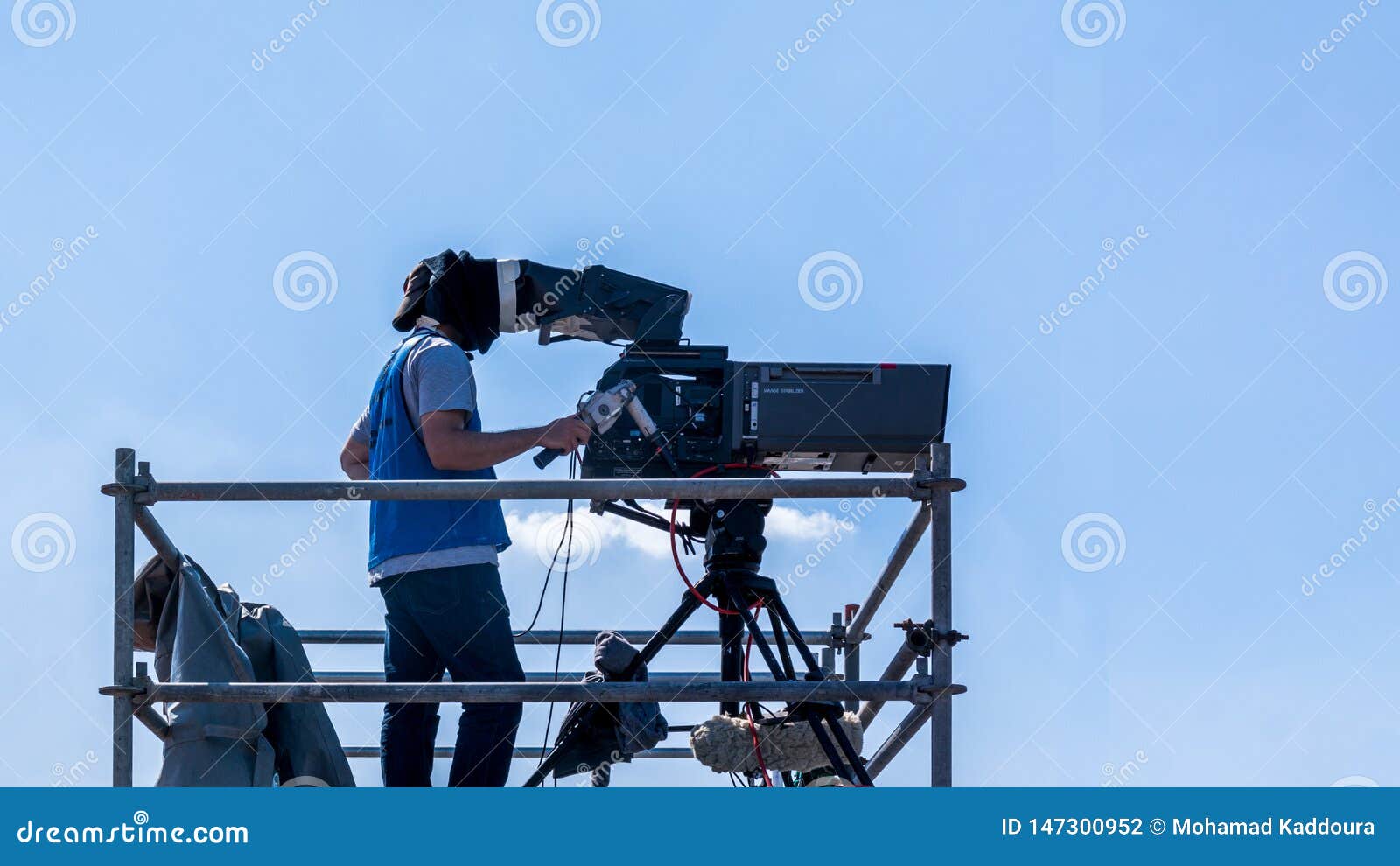 Video Camera Operator - Man Working and Filming on Set with His ...