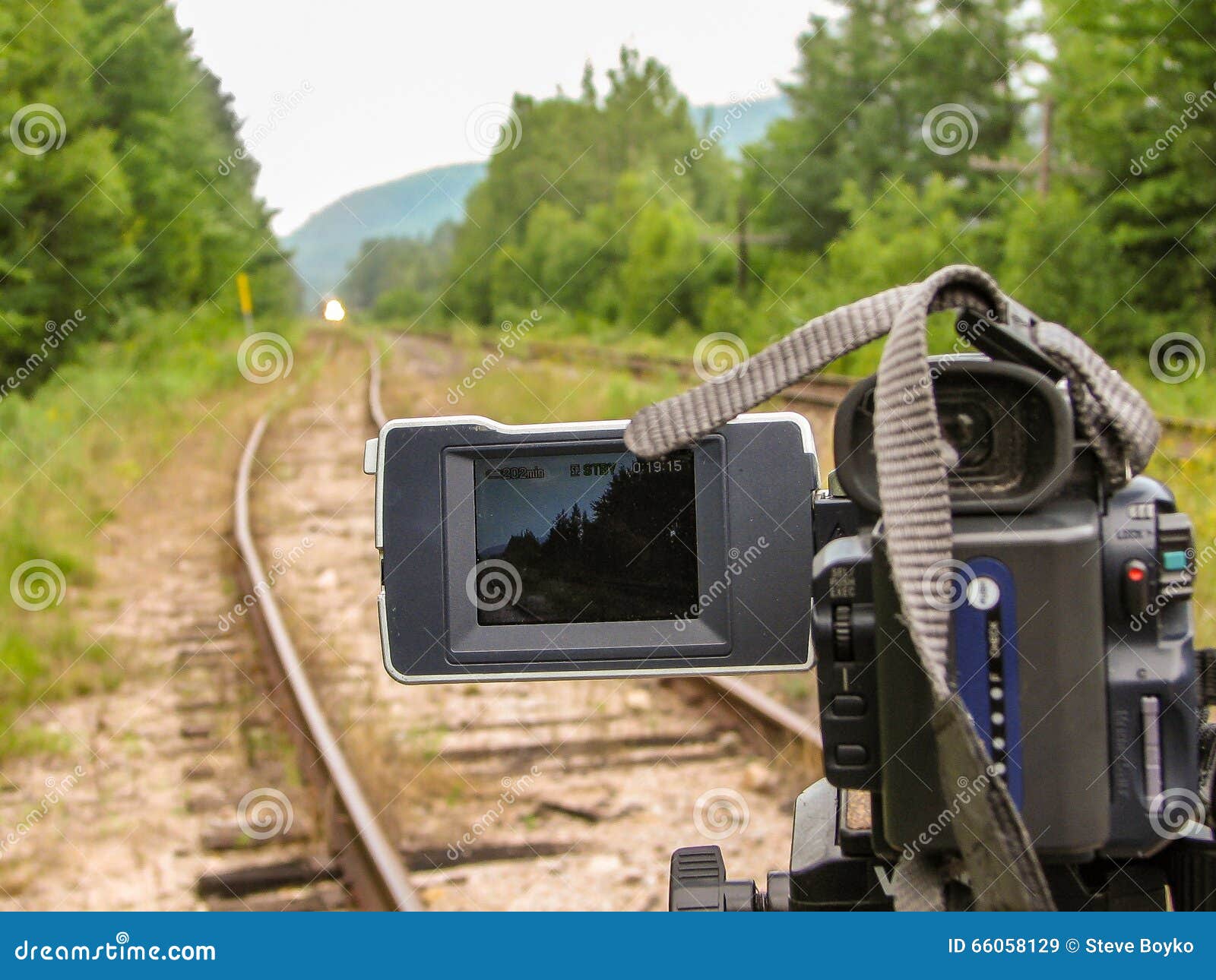 Video Camera Watching Train Tracks Stock Image - Image of green, tracks ...