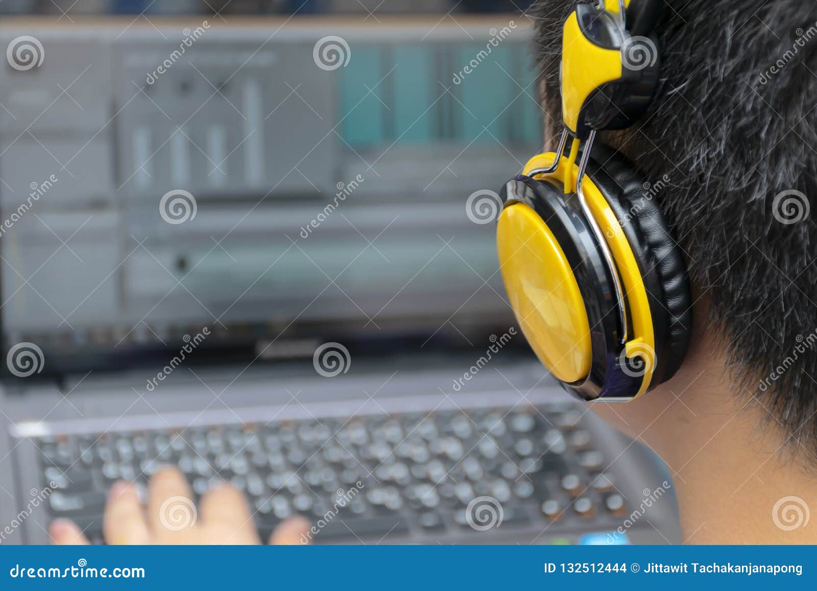Video Editing,Back View of Young Man Using Computer Software and Stock ...
