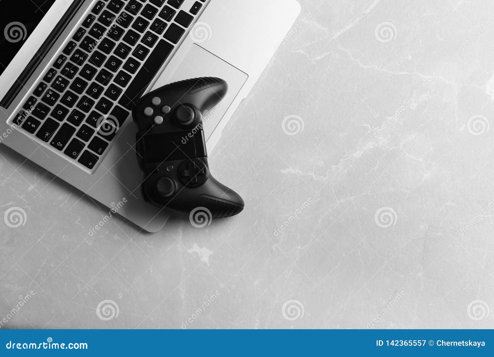 Video Game Controller and Laptop on Grey Background, Top View Stock ...