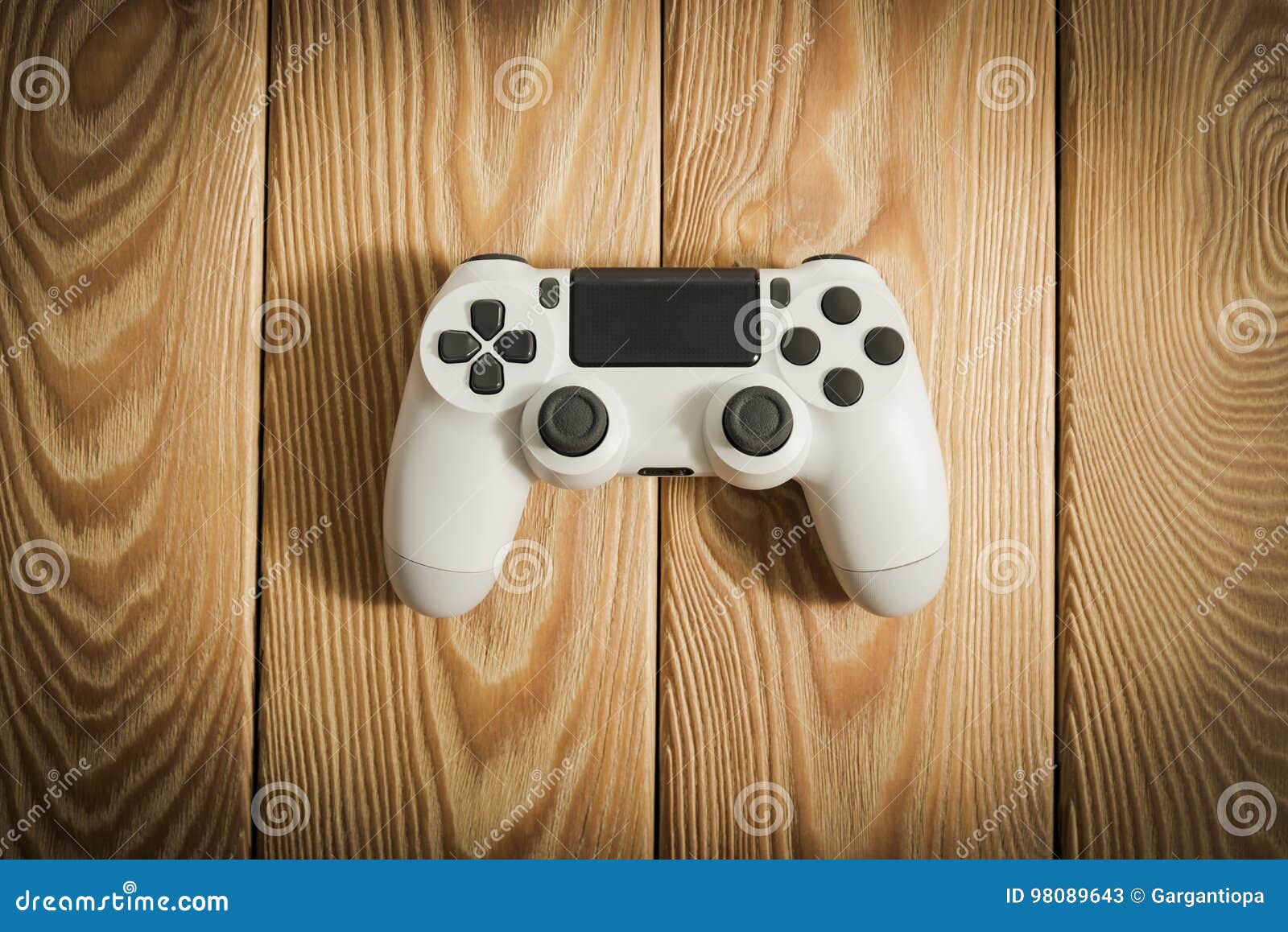 Video Game Controller on a Wooden Table Stock Image - Image of ...