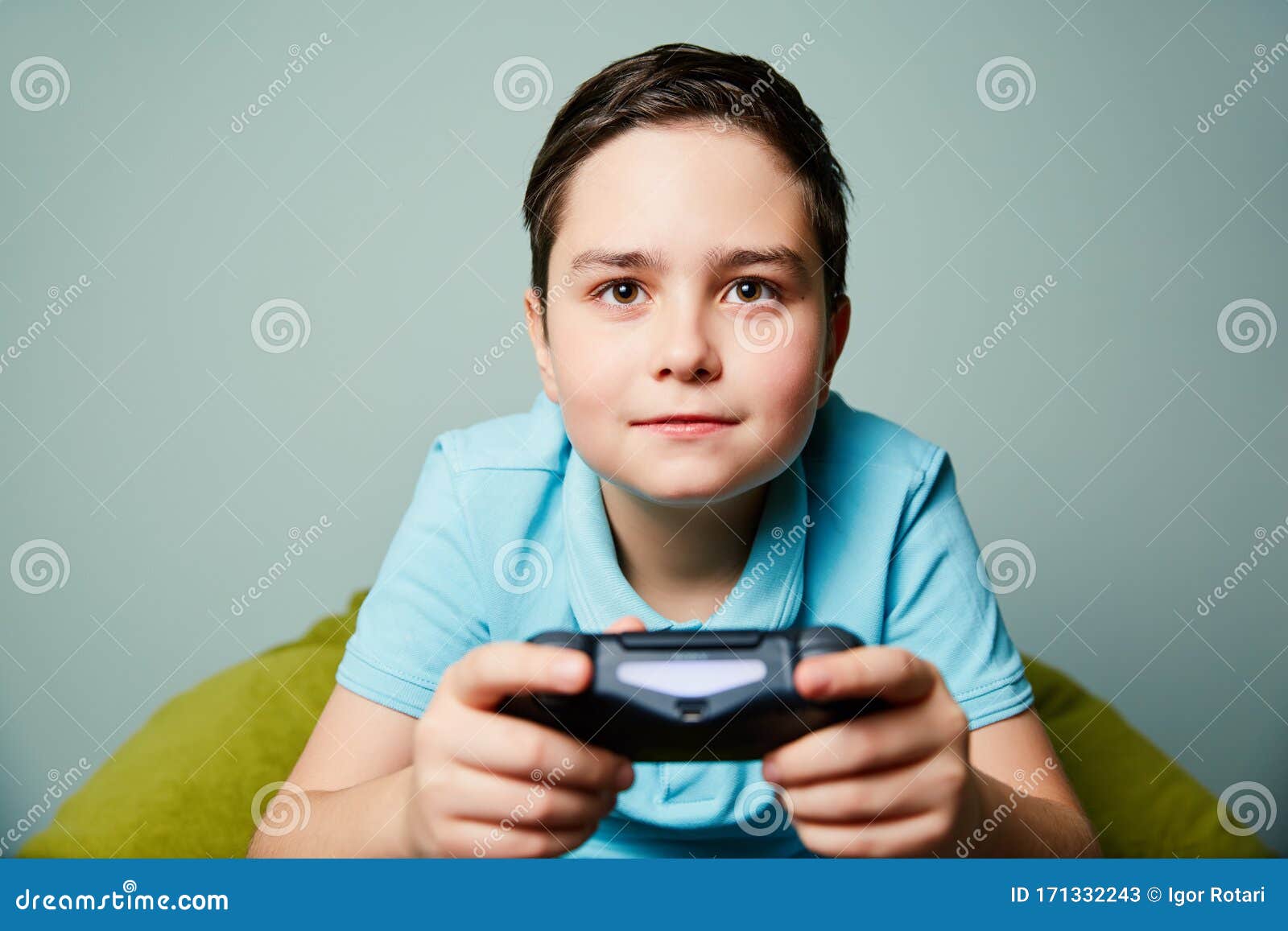 Boy playing video game stock image. Image of child, gaming - 171332243