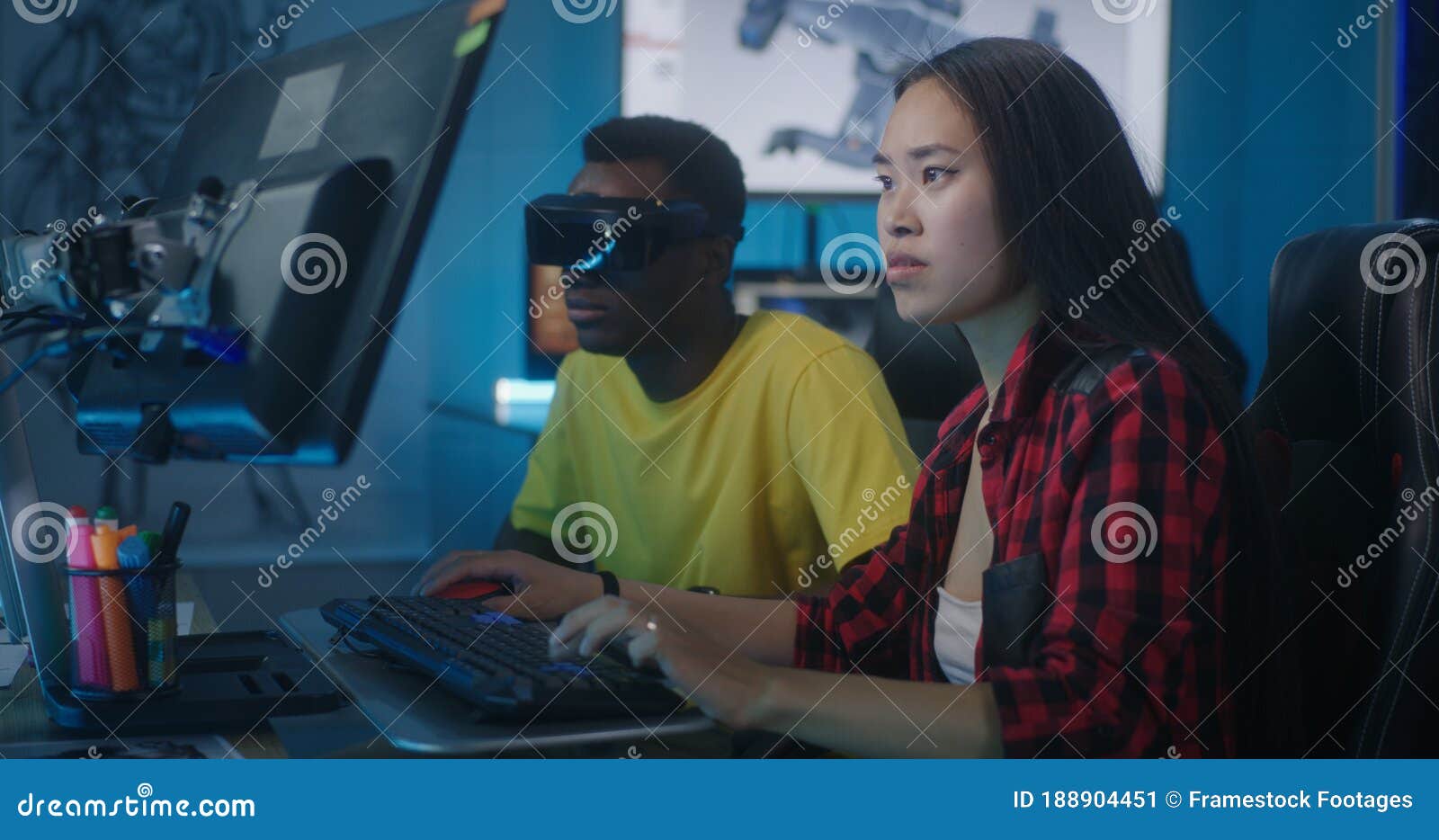 Video Game Developers Working Together Stock Image - Image of indoors ...