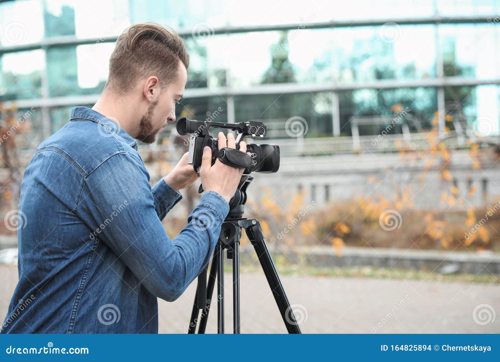 Video Operator with Camera Working on Street. Space for Text Stock ...
