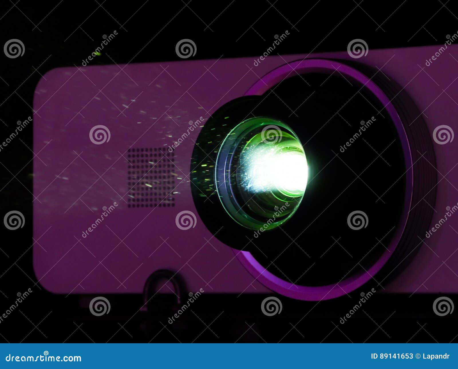 The Video Projector. the Beam of Light from the Lens, Dust in the Air ...
