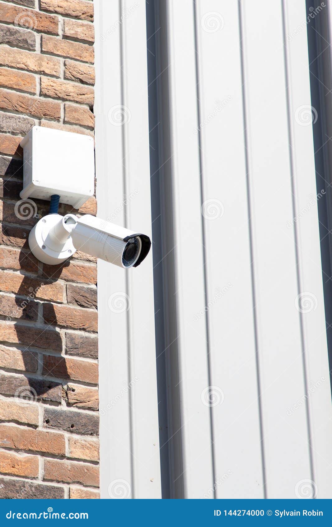 Video Security Camera Housing Mounted High in Building Stock Photo ...