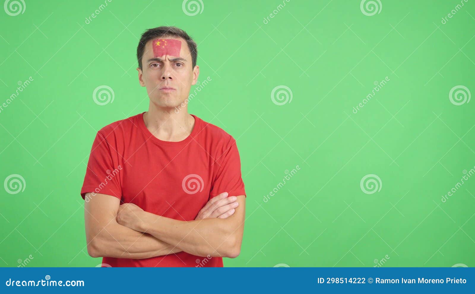 Dignified and Serious Man with Chinese Flag Painted on Face Stock ...