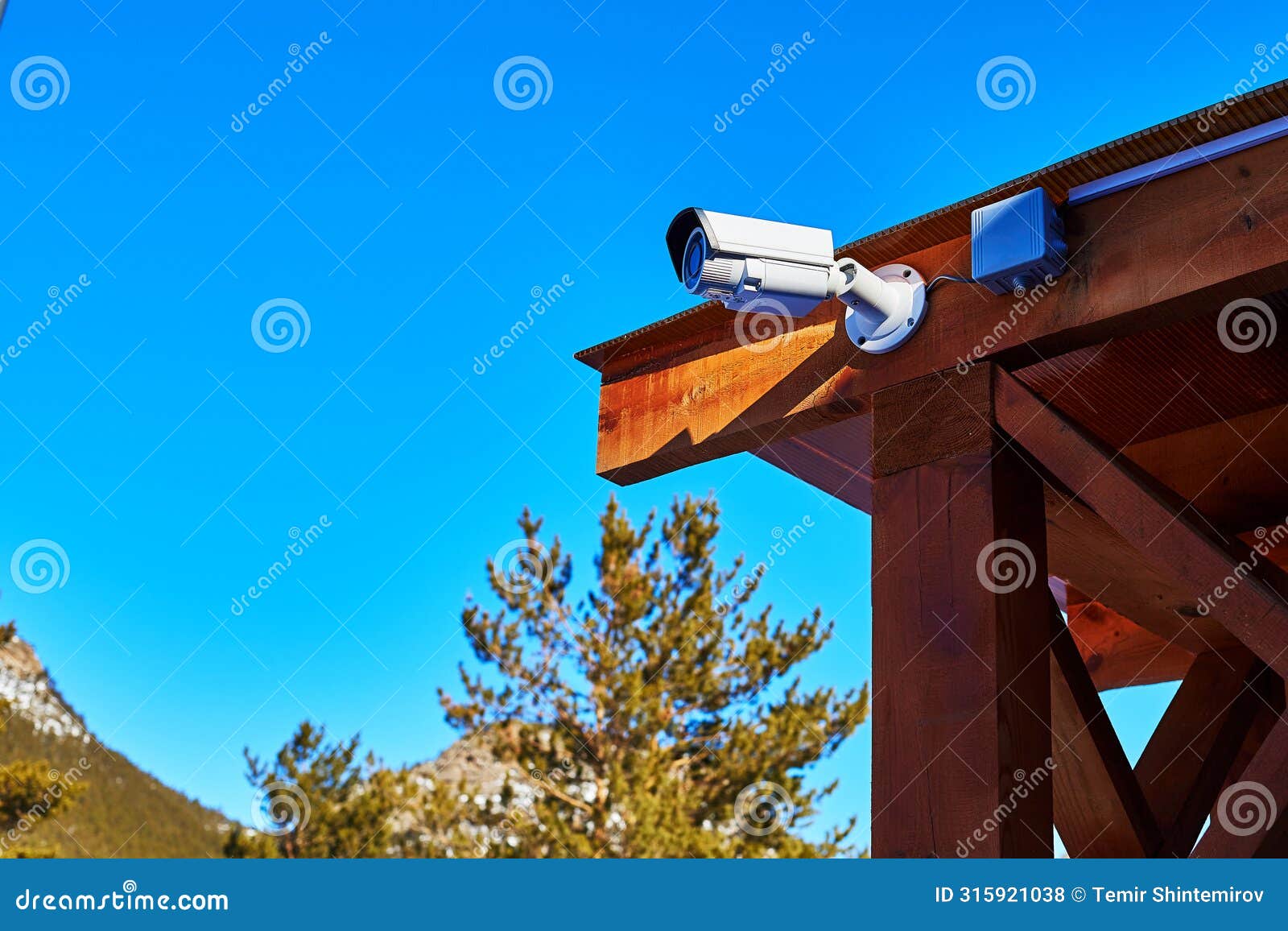 Video Surveillance Camera Mounted on a Wooden Canopy Stock Photo ...