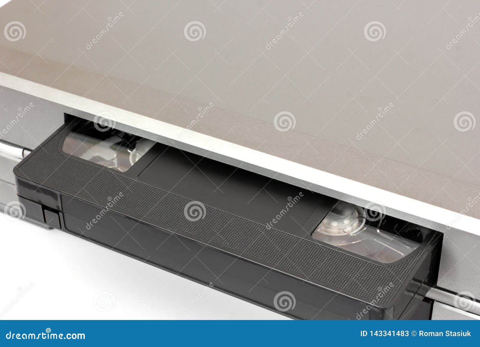 Videocassette and VCR on a White Background Stock Image - Image of ...