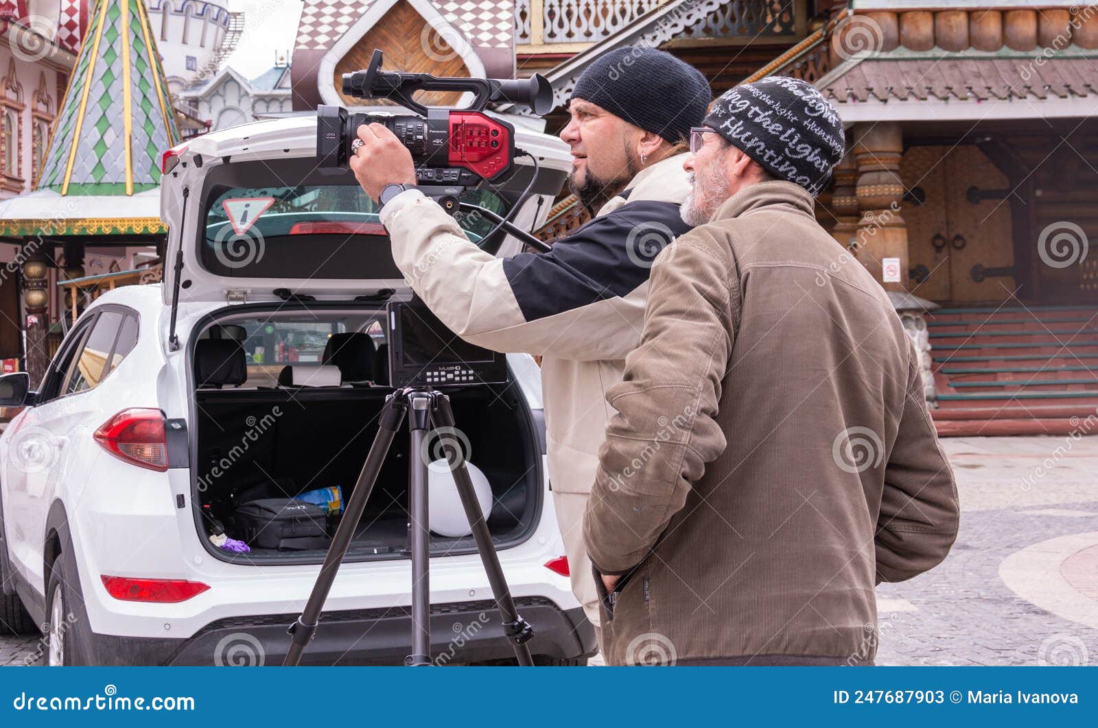 A Videographer Shoots a Video on a Video Camera. the Shooting Process ...