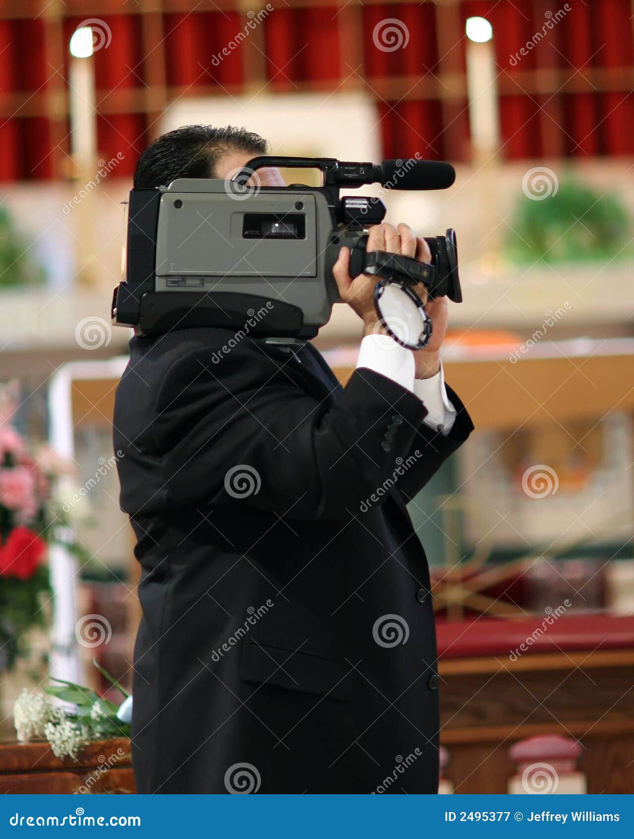 Videographer at Wedding stock image. Image of religion - 2495377