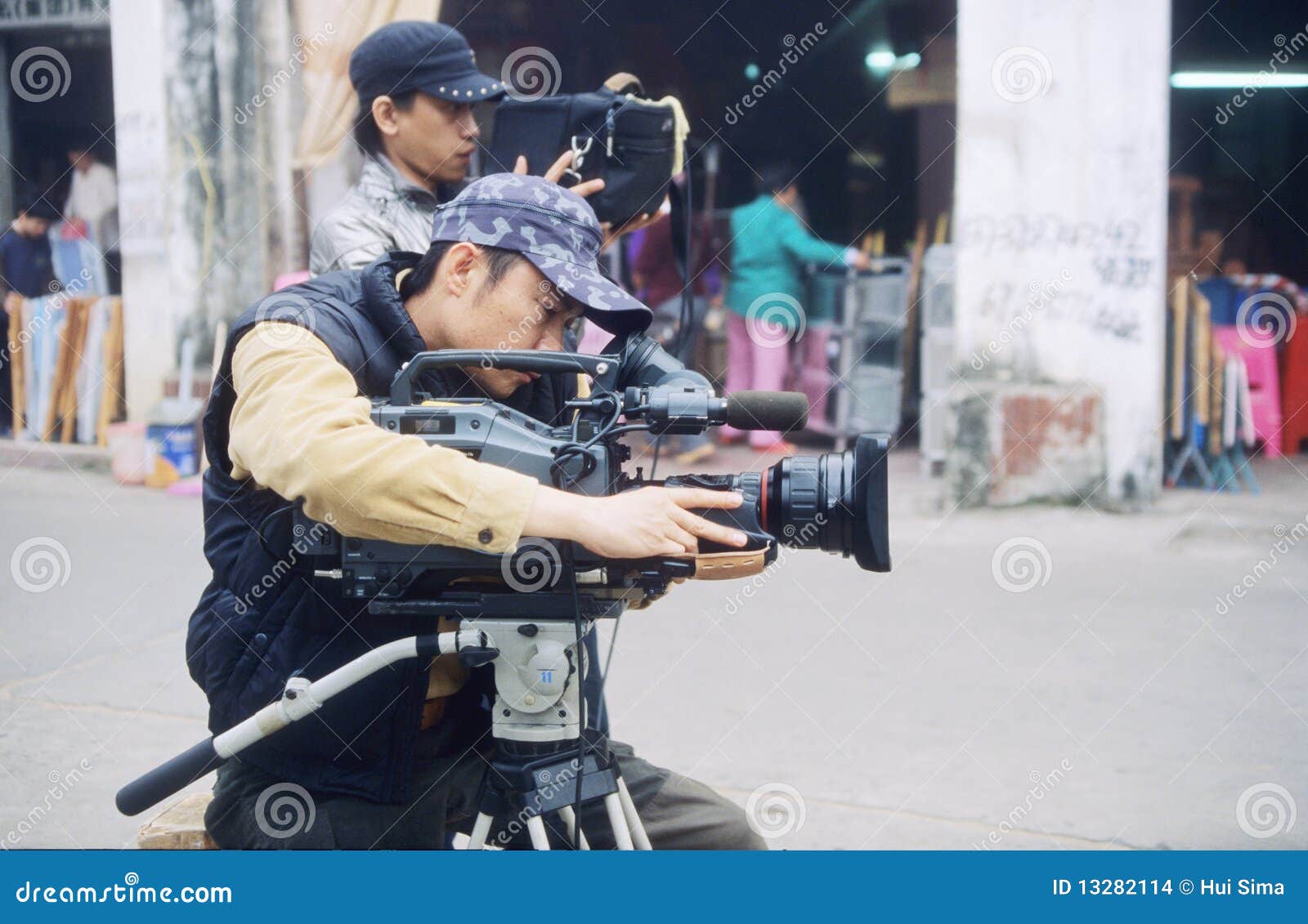 Videographers stock photo. Image of chinese, videographer - 13282114