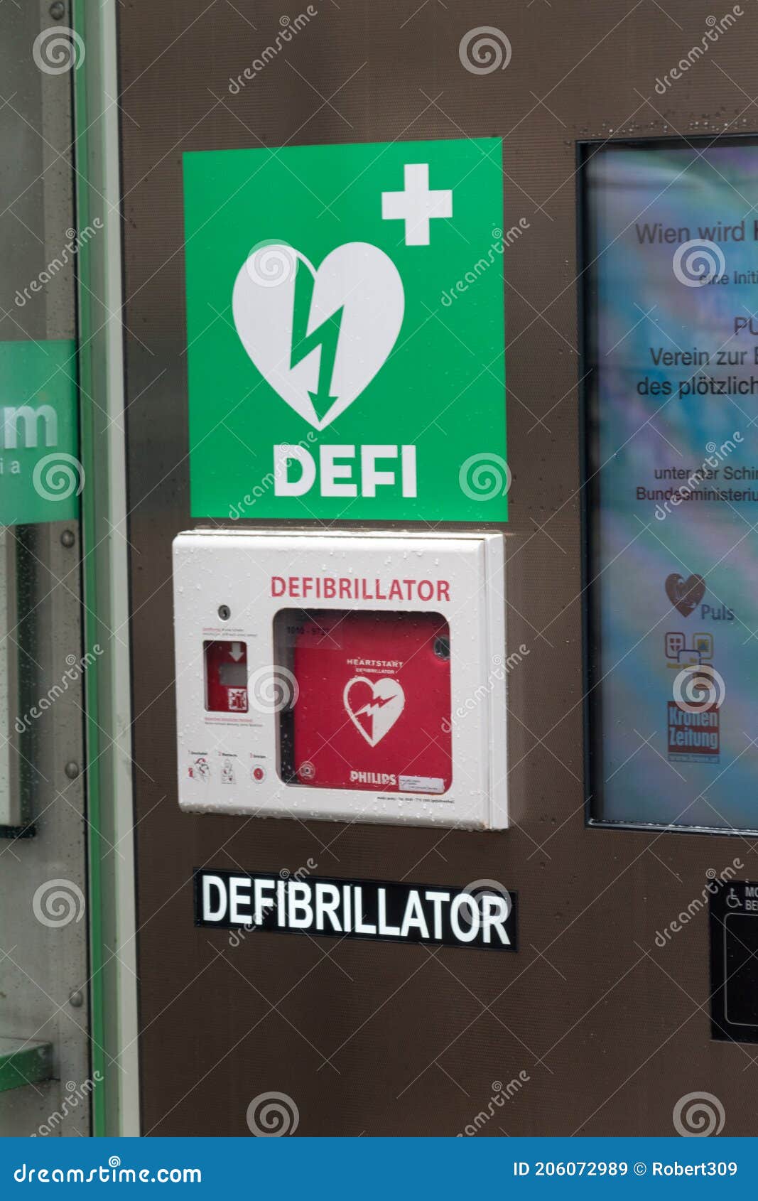 Automated External Defibrillator AED in White Box on the Wall Editorial ...