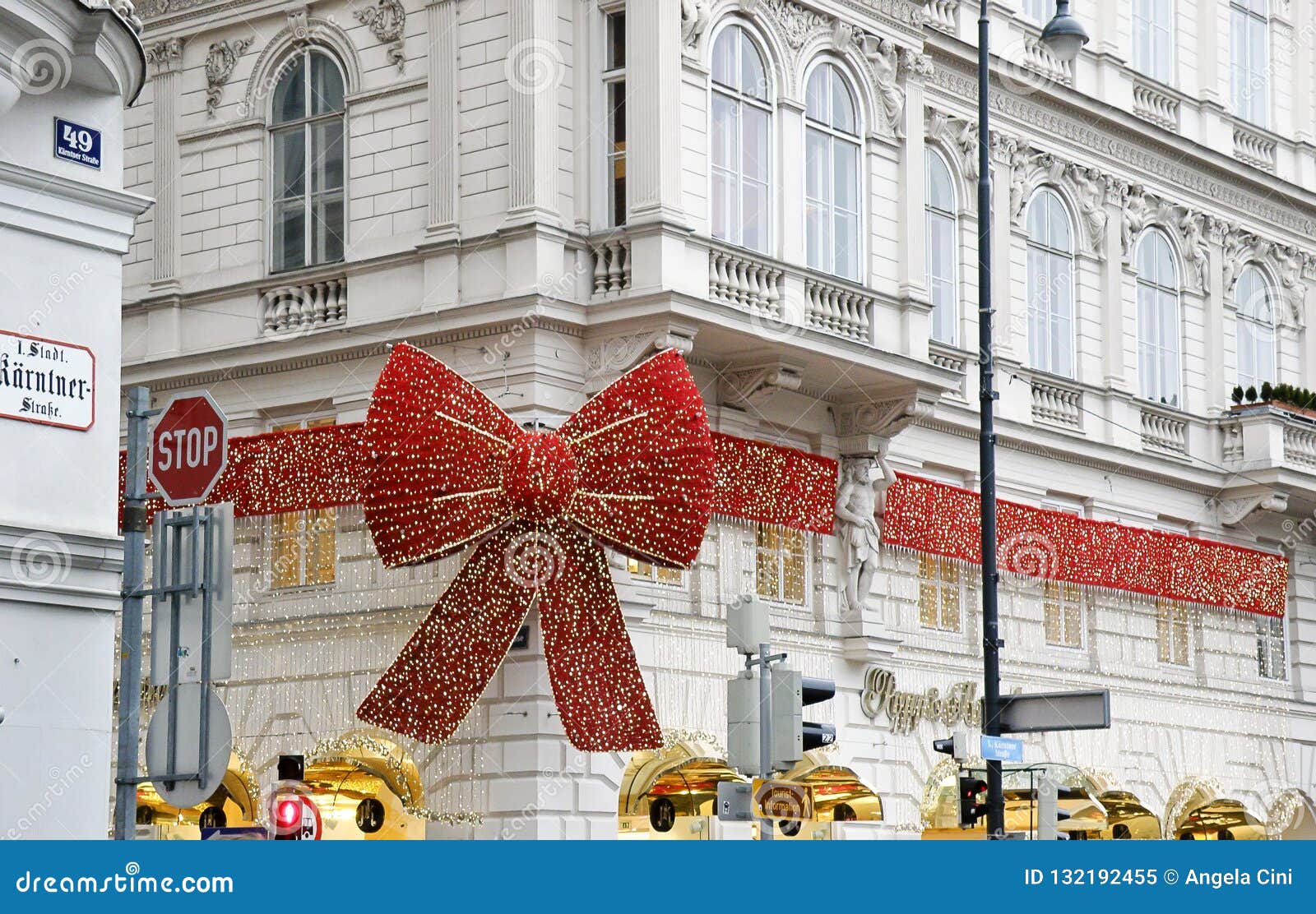 Big Red Christmas Ribbon Design On New York City Building Side ...
