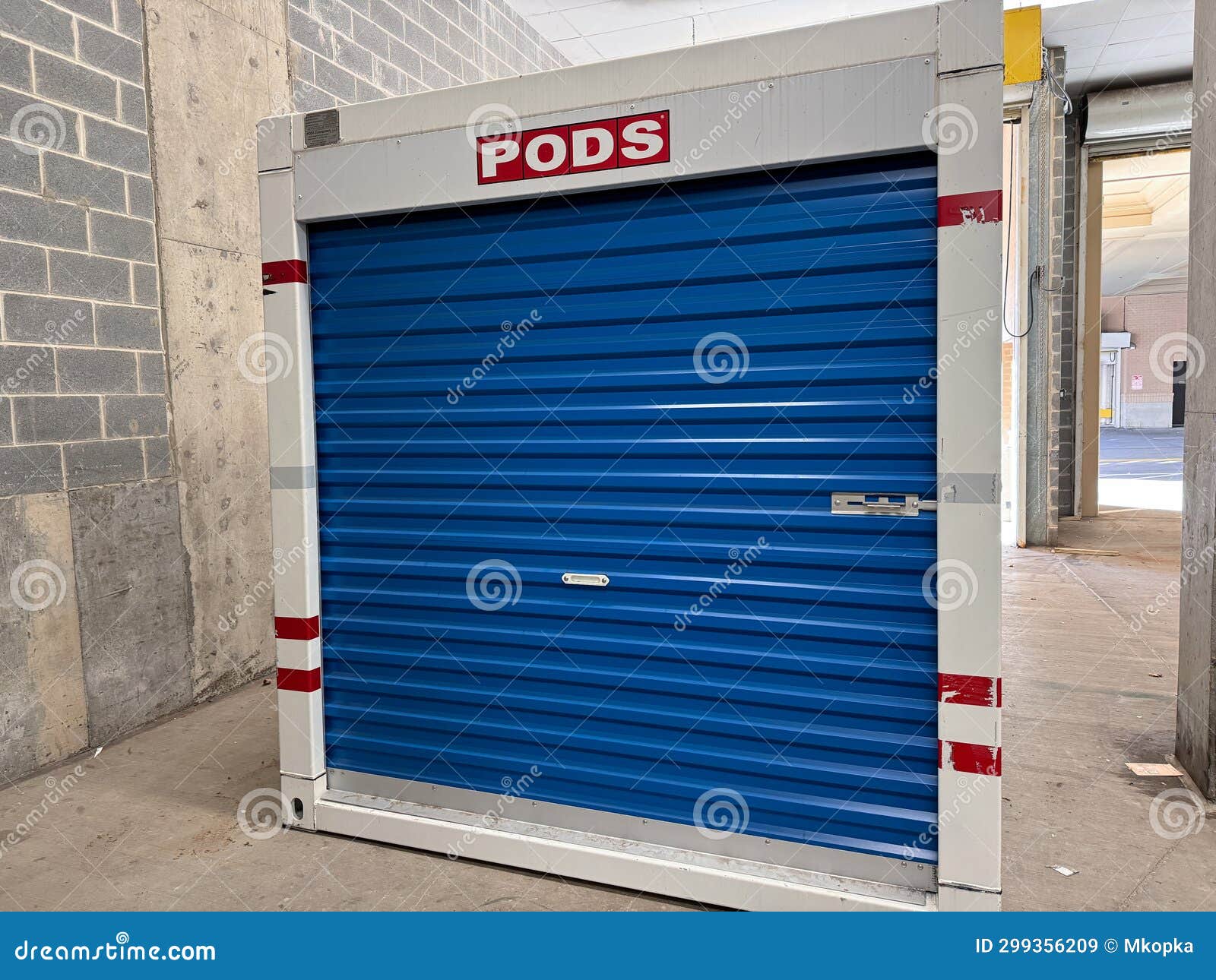 A PODS Storage and Moving Container Placed at a Loading Dock in an ...
