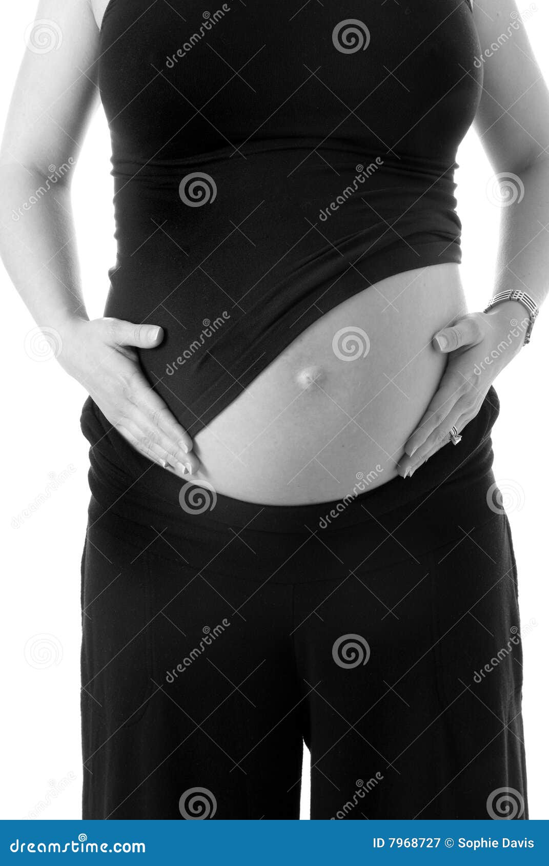 Vientre embarazado. imagen de archivo. Imagen de negro - 7968727