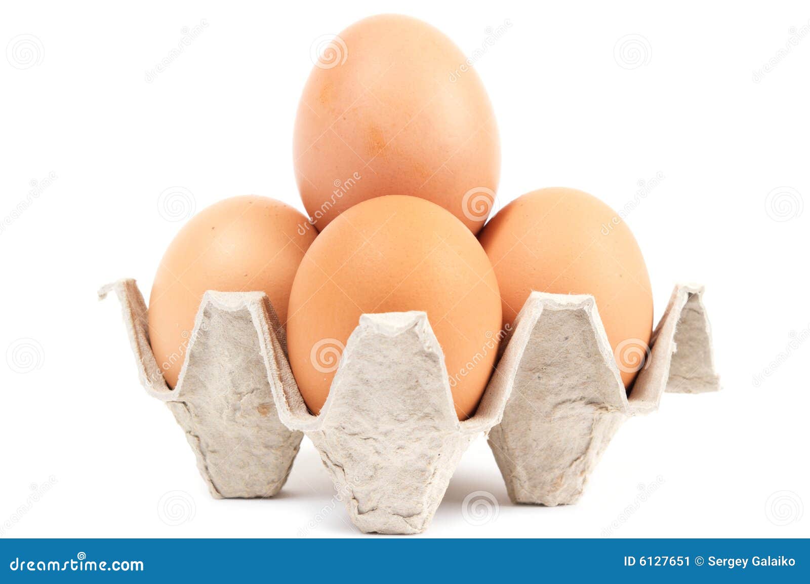 Vier Eier in der Zelle stockbild. Bild von zelle, nahrung - 6127651