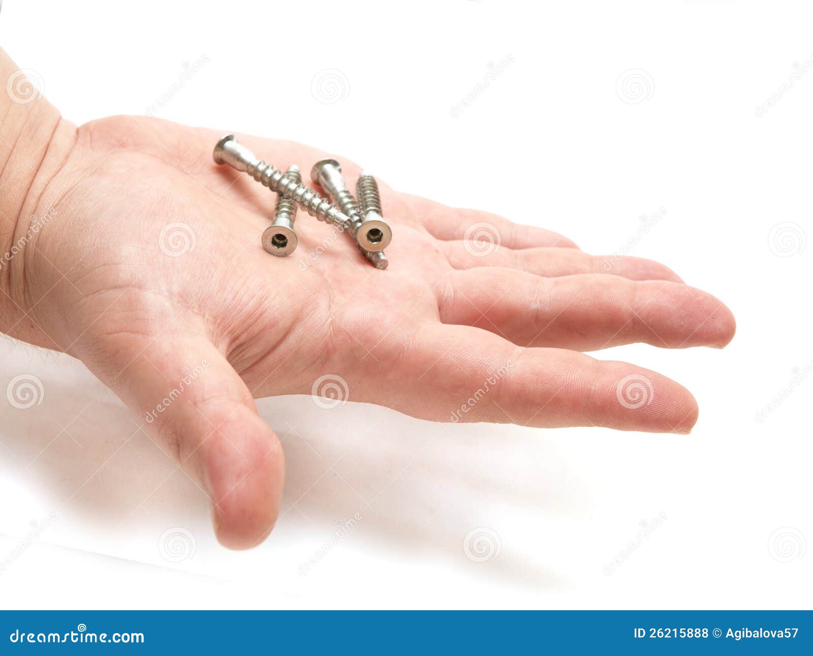 Vier Schrauben Auf Einer Menschlichen Hand Stockfoto - Bild von leuchte ...