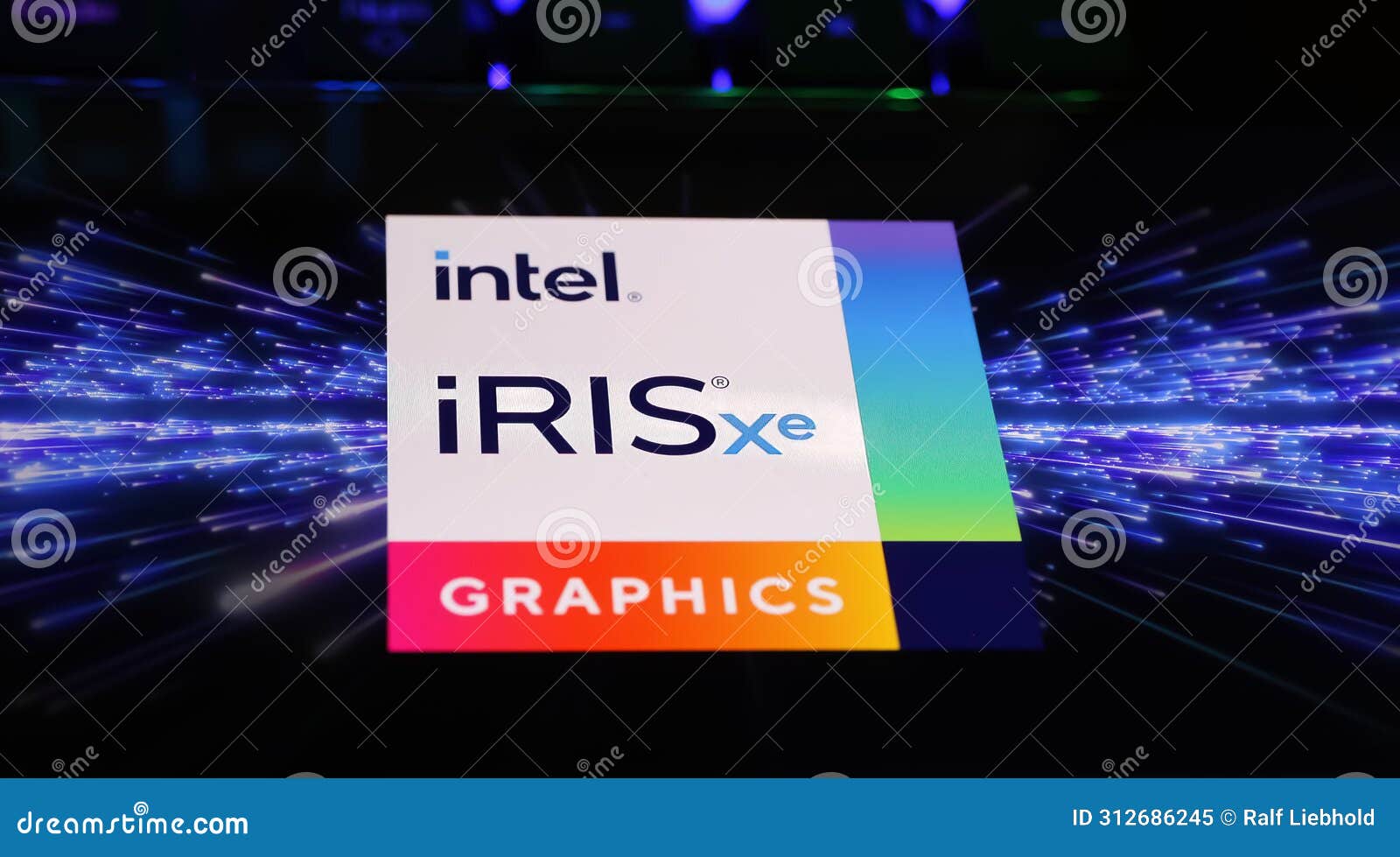 Closeup of Smartphone on Computer Keyboard with Logo Lettering of Intel ...