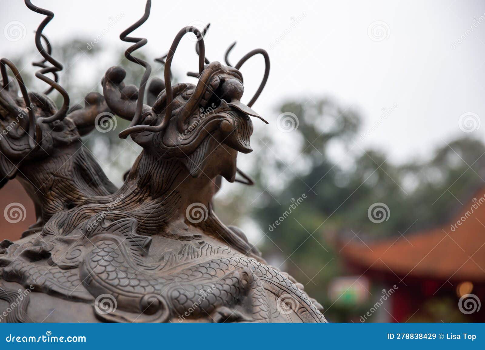 Vietnamese carved statue stock image. Image of designed - 278838429