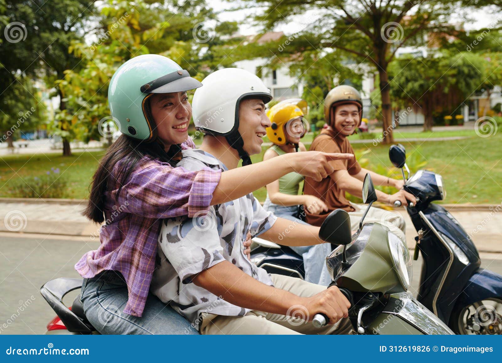 Vietnamese Couples Riding Motorbikes Stock Photo - Image of people ...