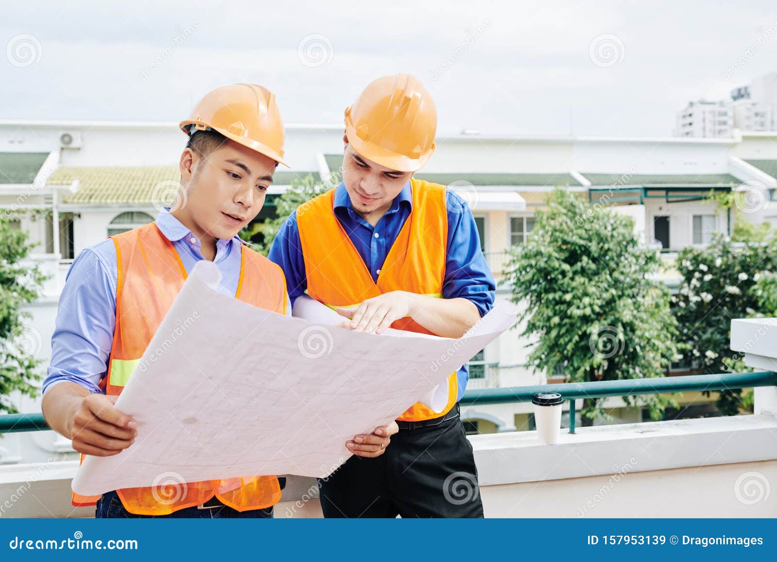 Engineer and Contractor Discussing Blueprint Stock Image - Image of ...