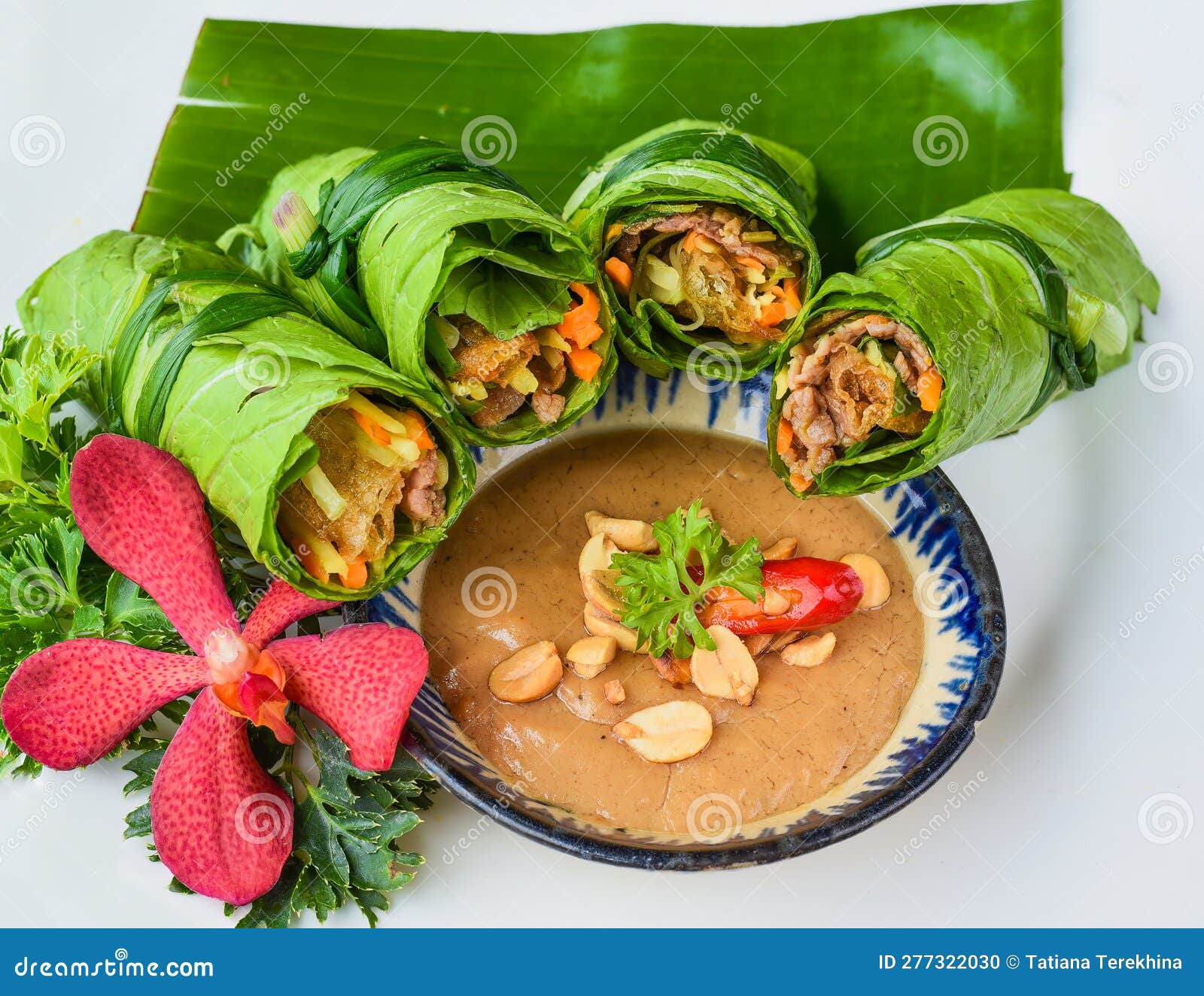 Vietnamese Green Nem Spring Rolls in Leaf with Sauce Stock Photo ...