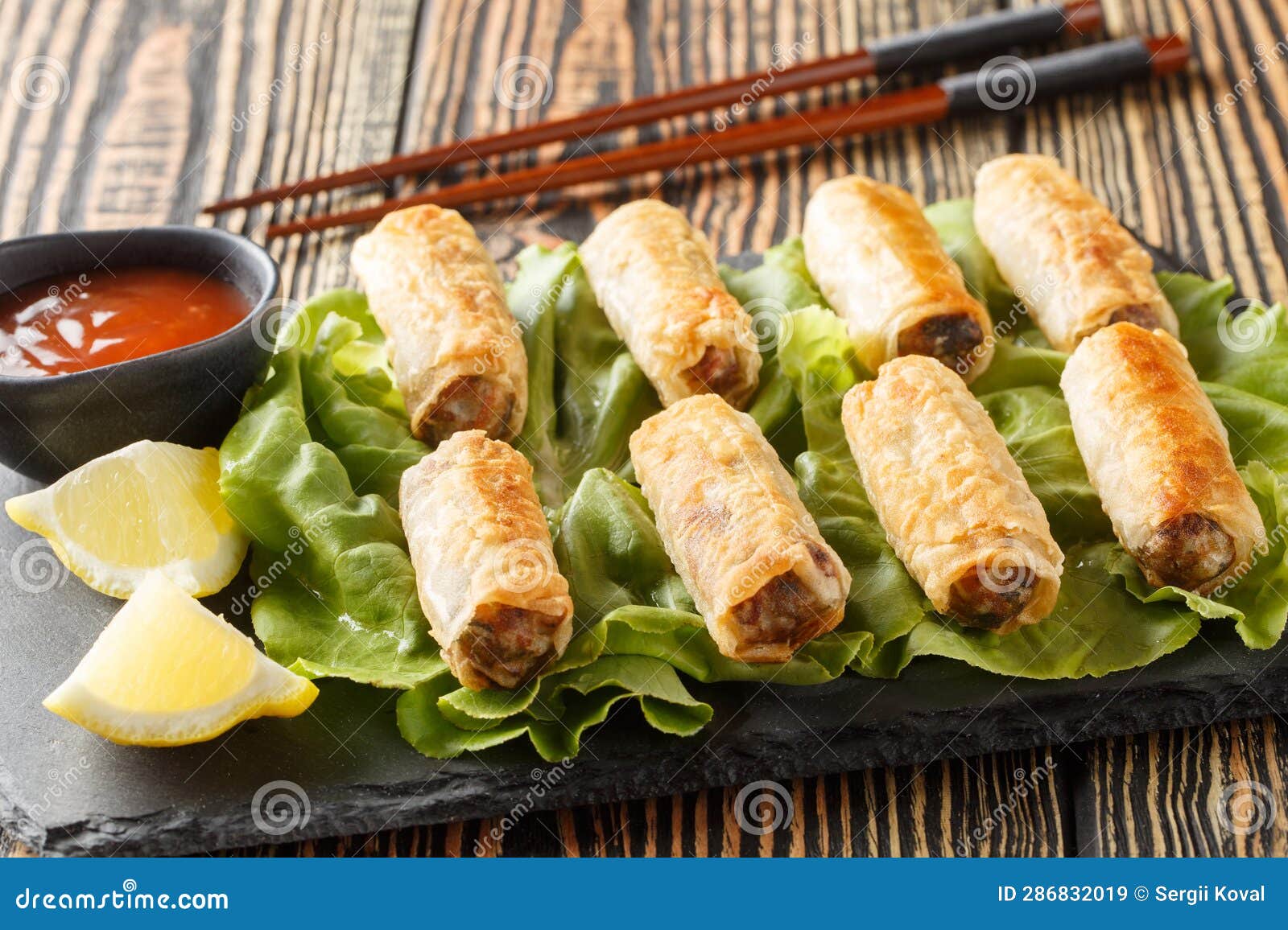 Vietnamese Nems or Deep Fried Spring Rolls with Chicken Closeup on the ...