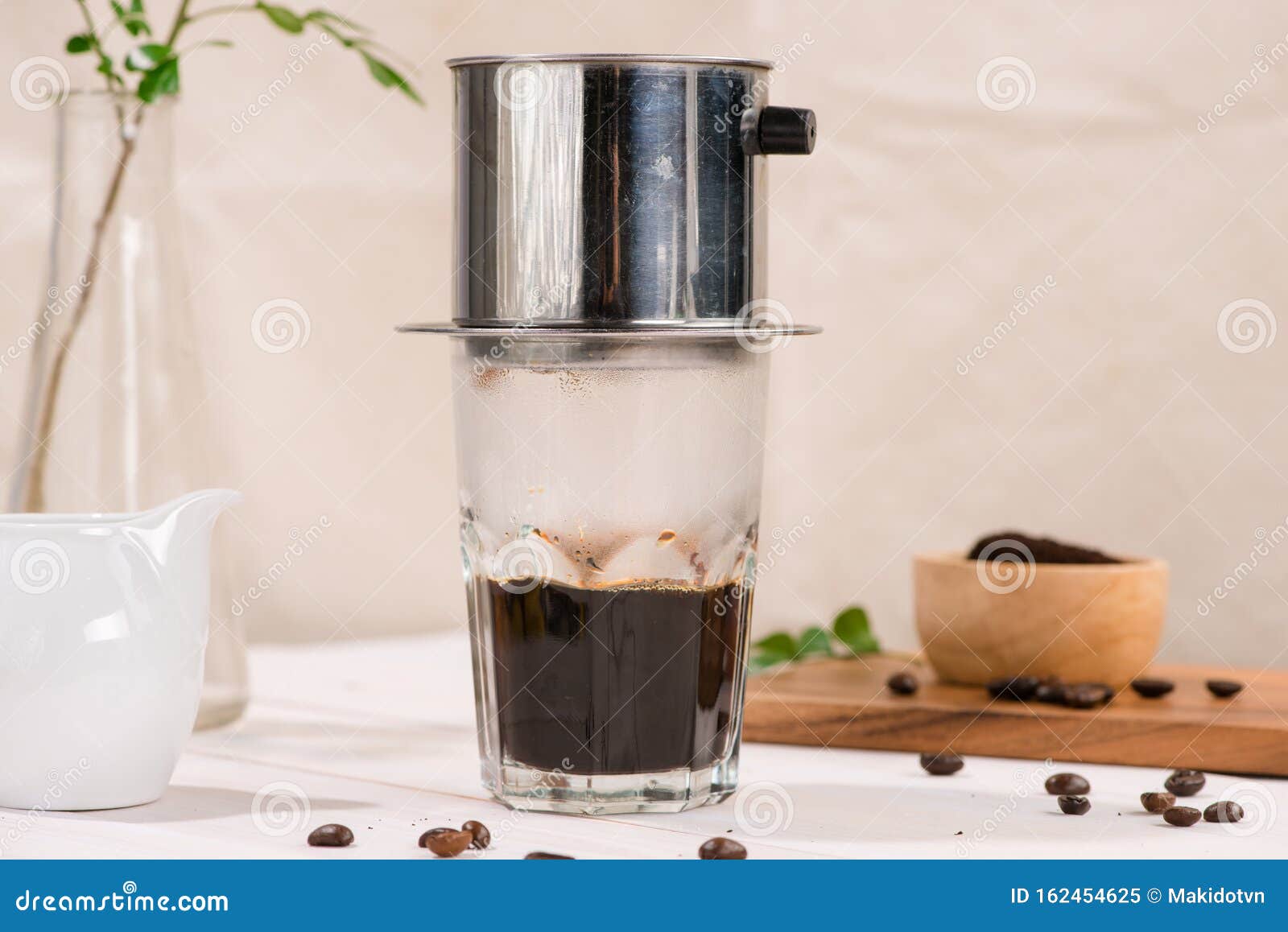 Vietnamese Traditional Coffee and Coffee Phin on Light Background Stock ...