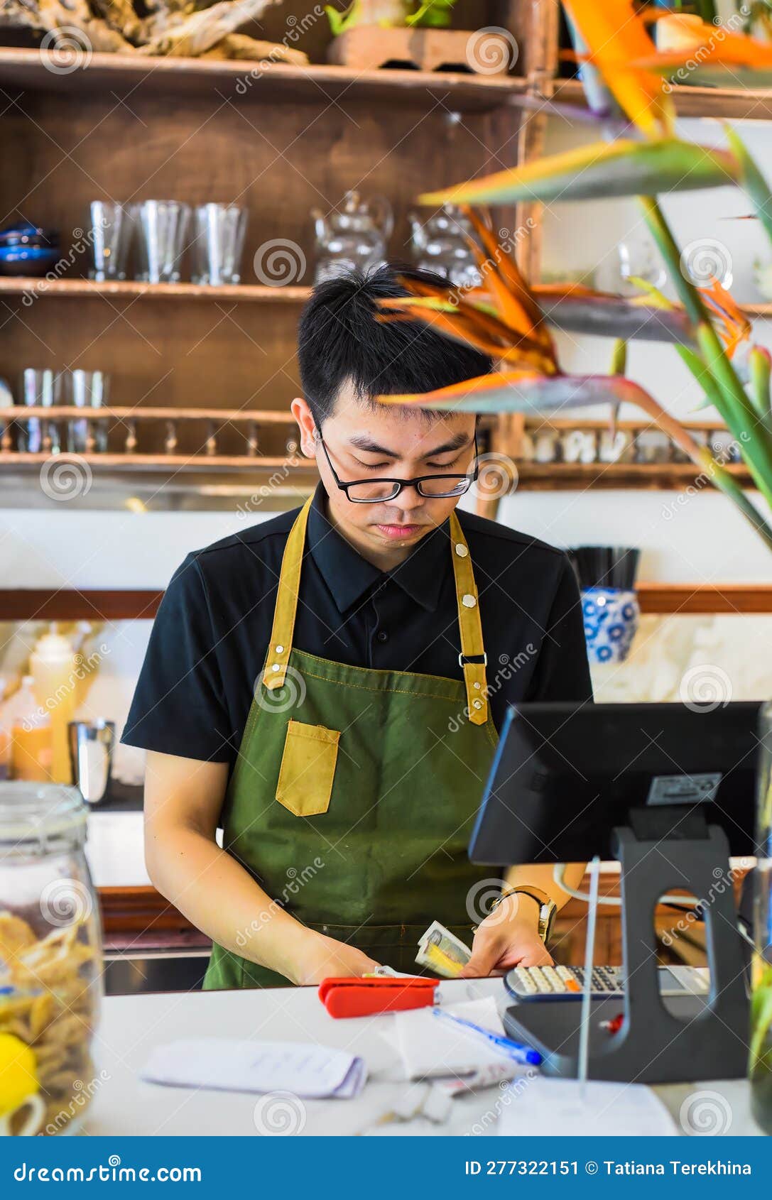 Vietnamese Waiter Working in Counter with Cashier Machine in a Cafe ...